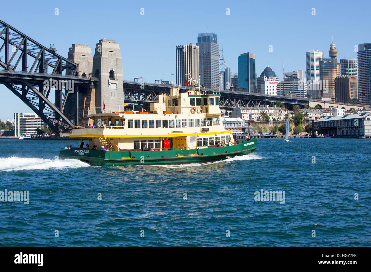Sydney transport ferry by the sydney harbour bridge and city centre ...
