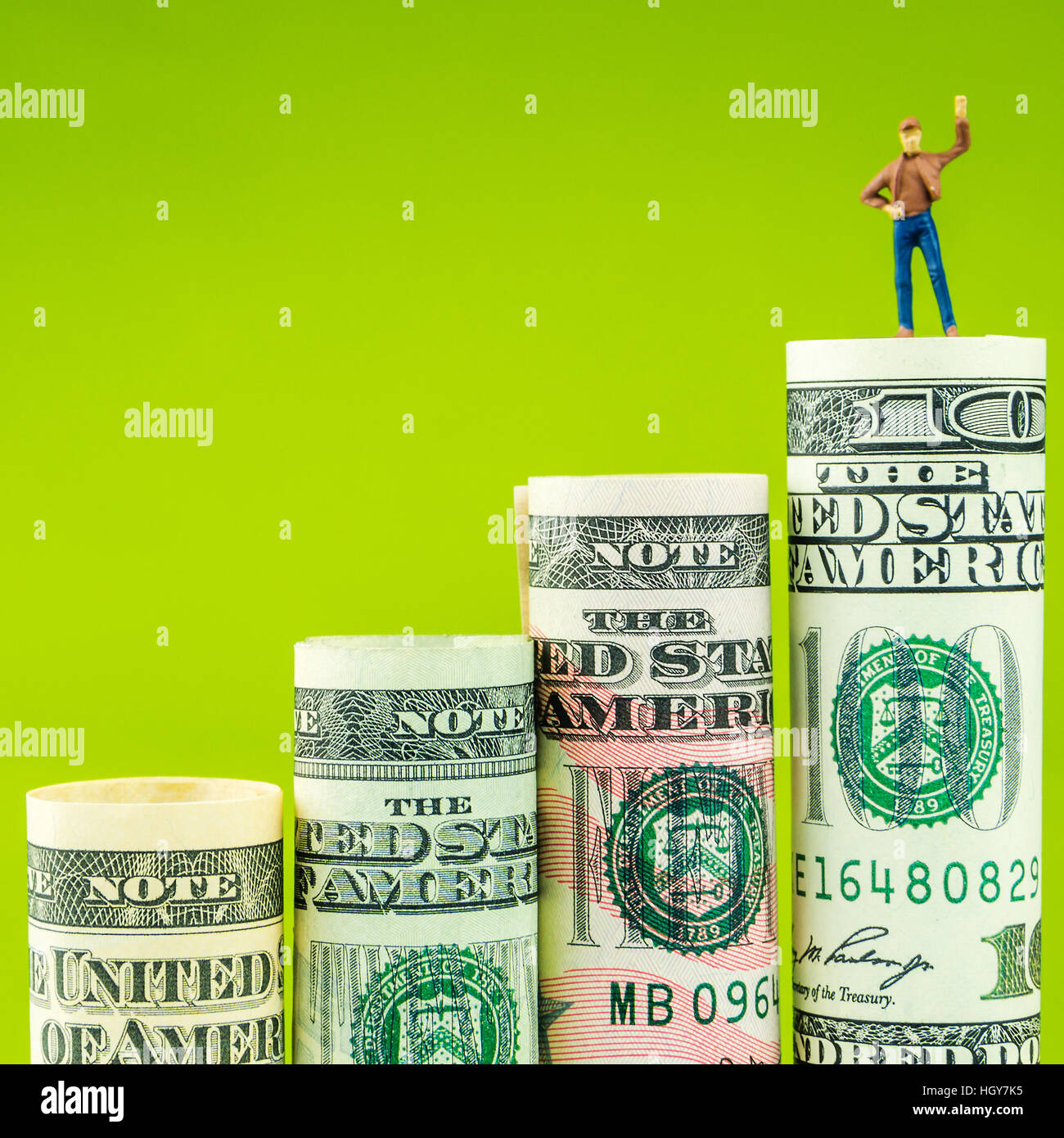 rising steps made of rolls of four most valued american dollar ...