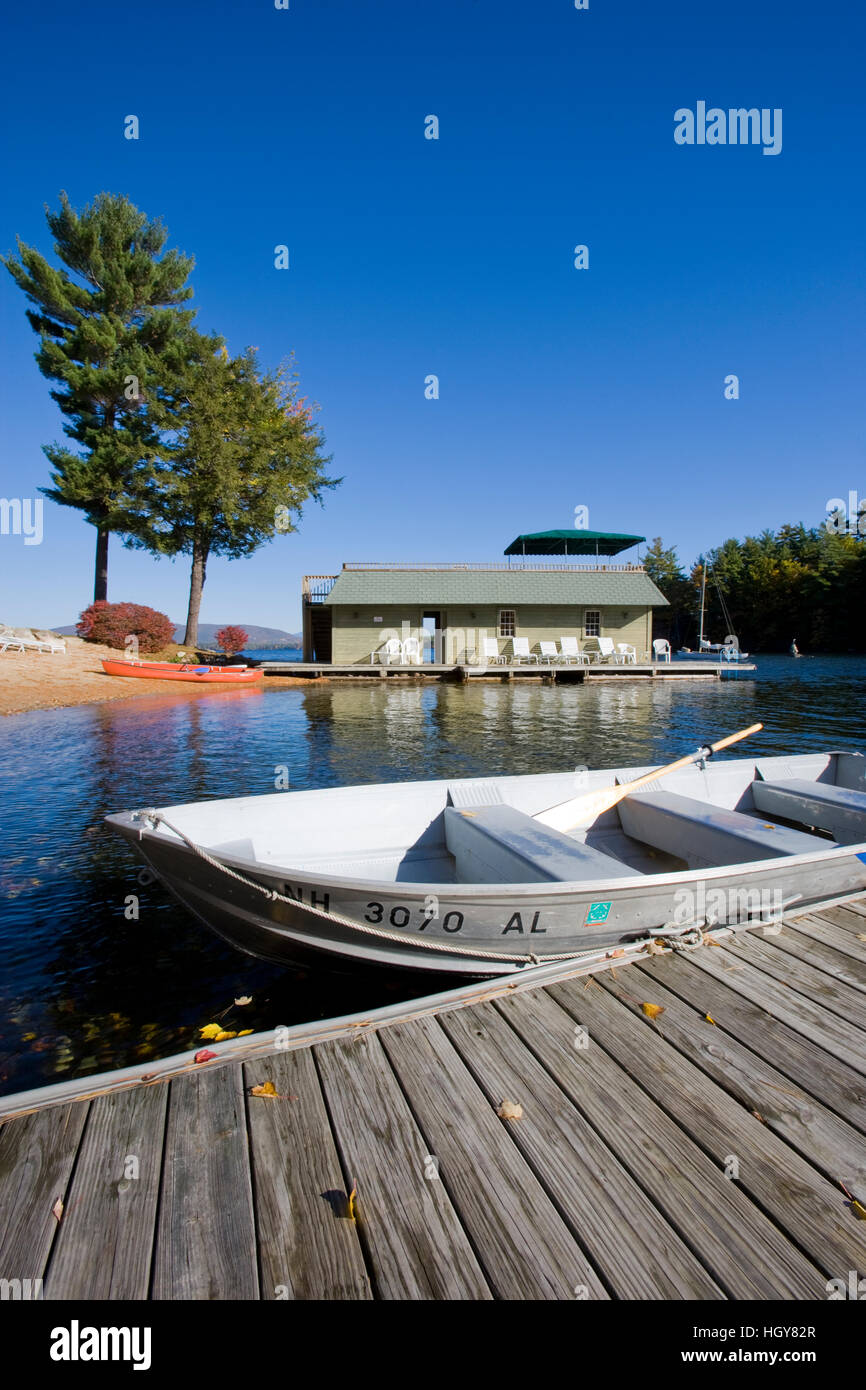 A skiff and the boathouse at Oliver Lodge on Lake Winnipesauke in ...