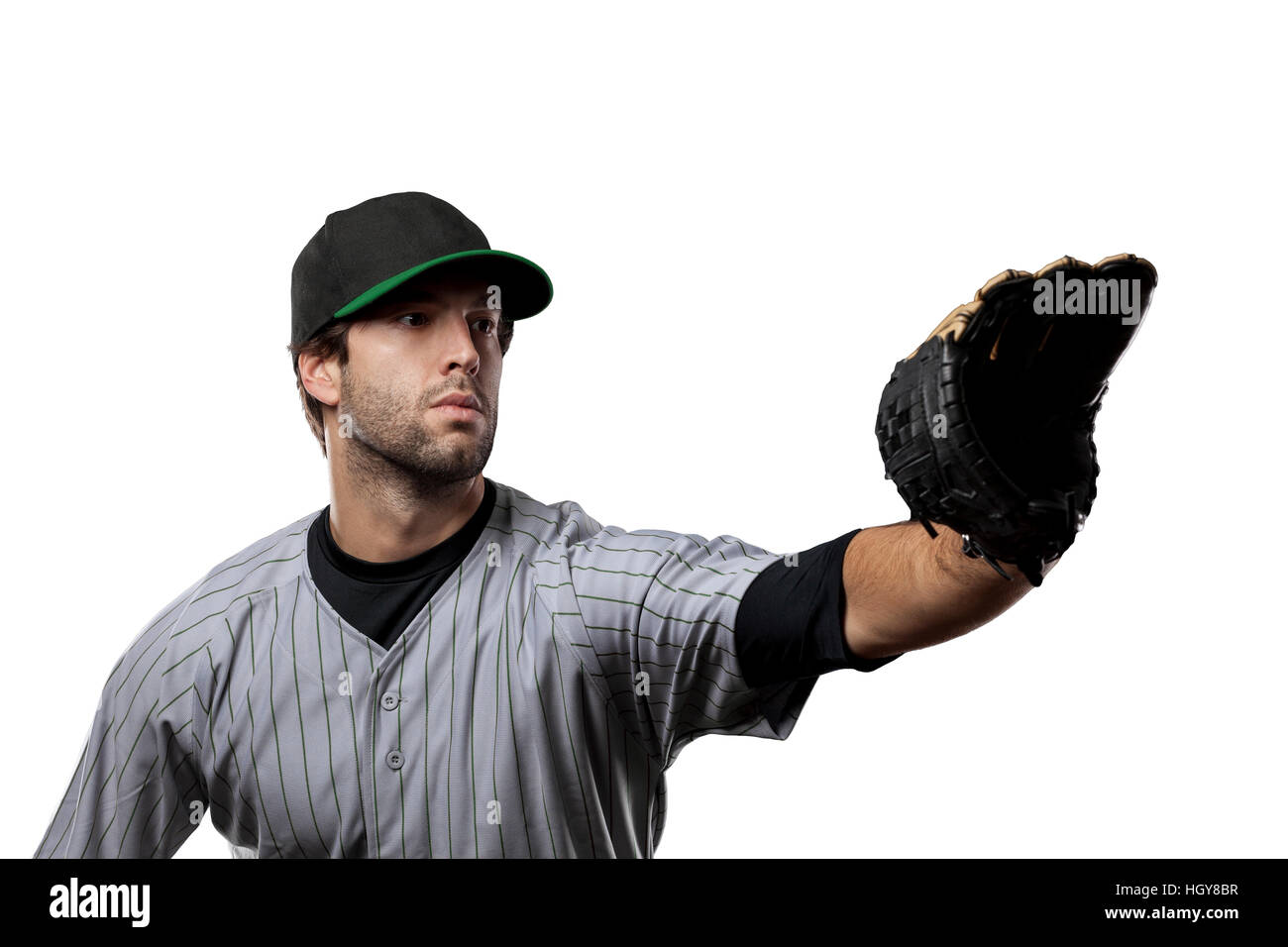 Baseball Player in a Green uniform, on a white background Stock Photo ...