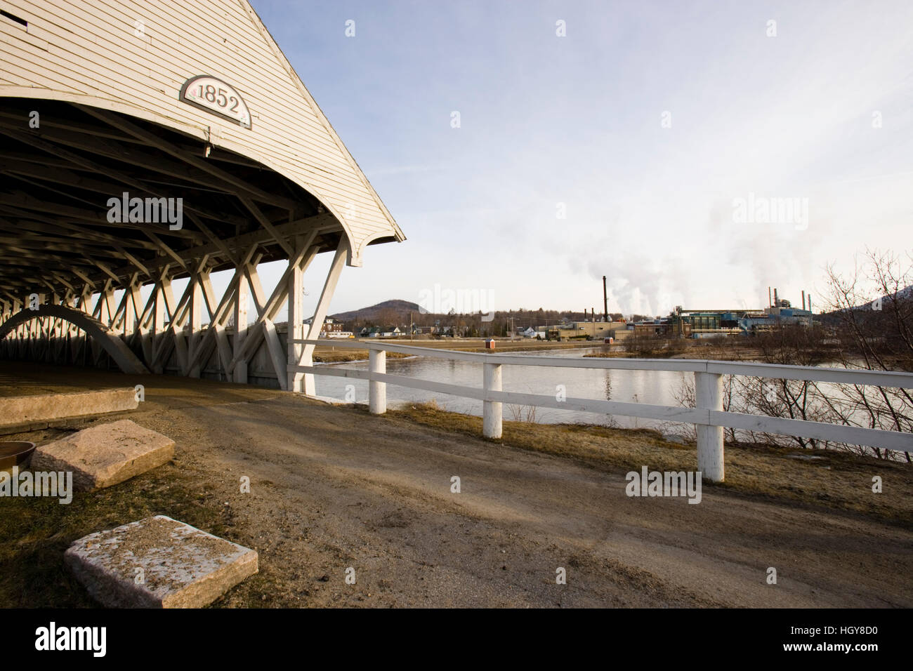 The covered bridge and Wausau Paper mill in Groveton, New Hampshire ...