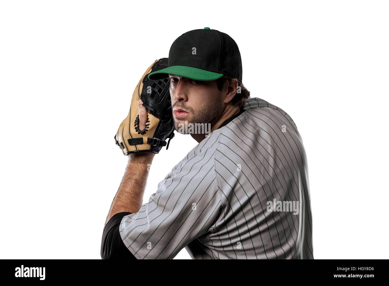 Baseball Player in a Green uniform, on a white background Stock Photo ...