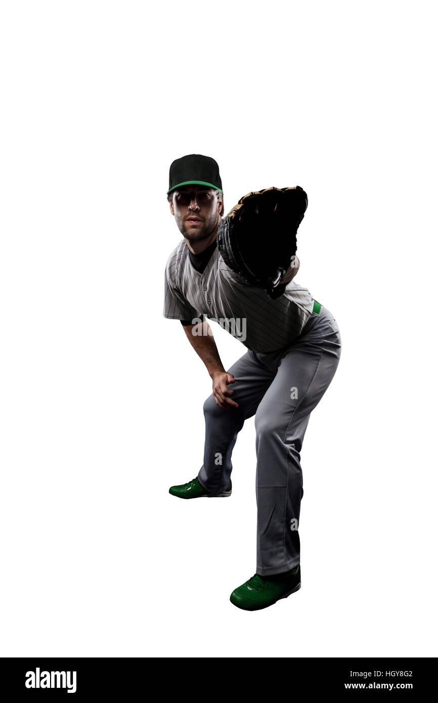 Baseball Player in a Green uniform, on a white background Stock Photo ...