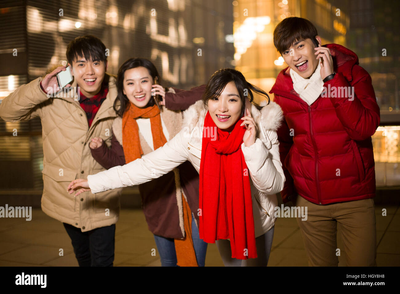 Talking on cell phones hi-res stock photography and images - Alamy