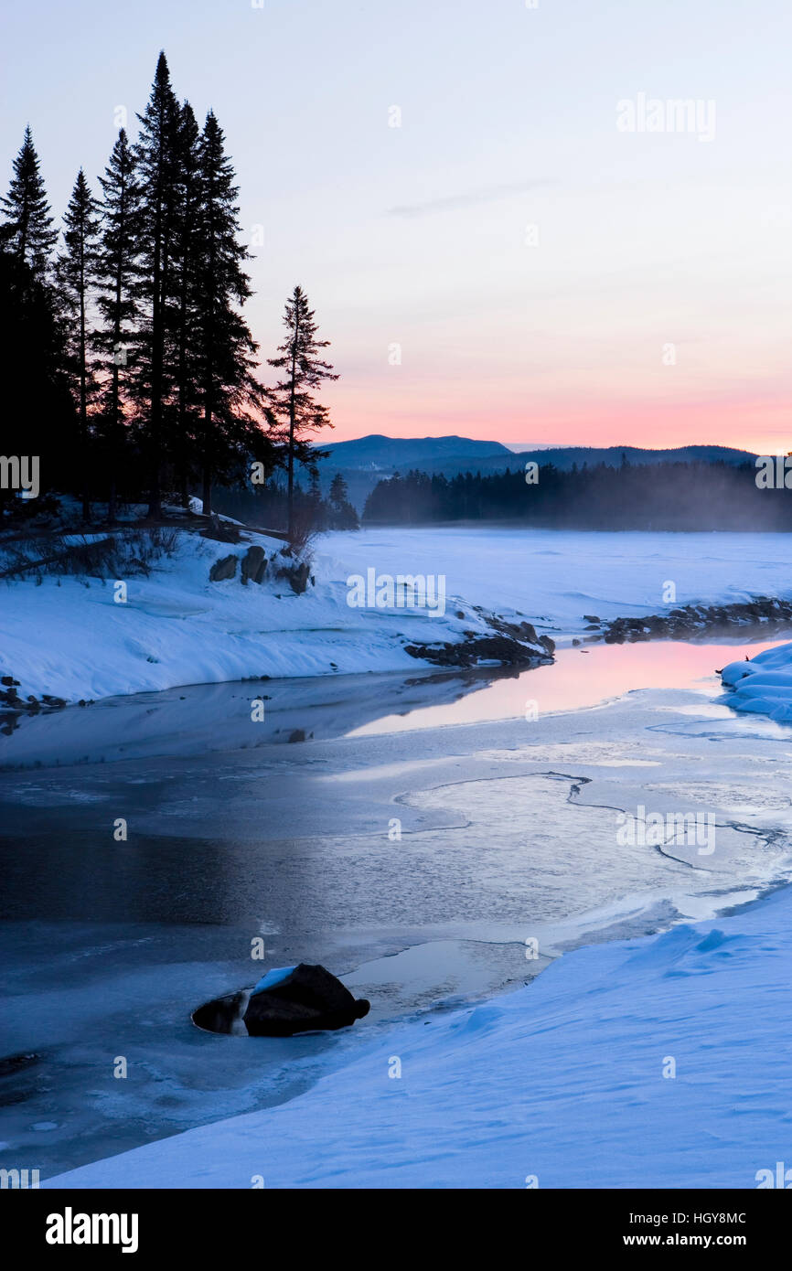 The outlet of Second Connecticut Lake in winter. Dawn. Pittsburg, New ...