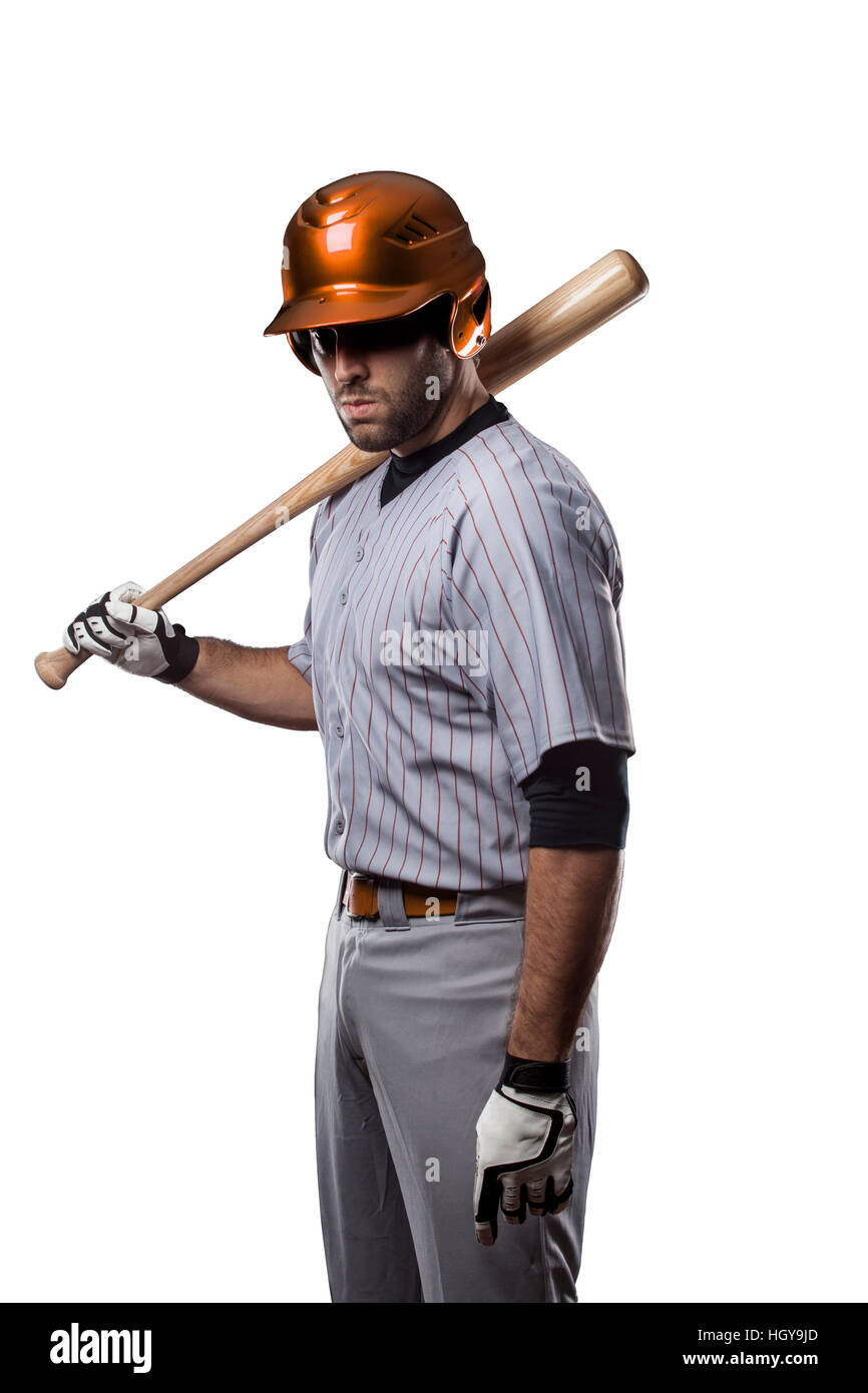 Baseball Player in a Orange uniform, on a white background Stock Photo ...
