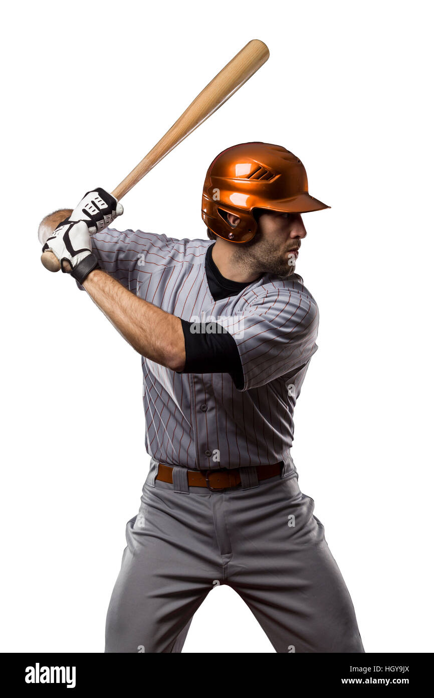 Baseball Player in a Orange uniform, on a white background Stock Photo ...