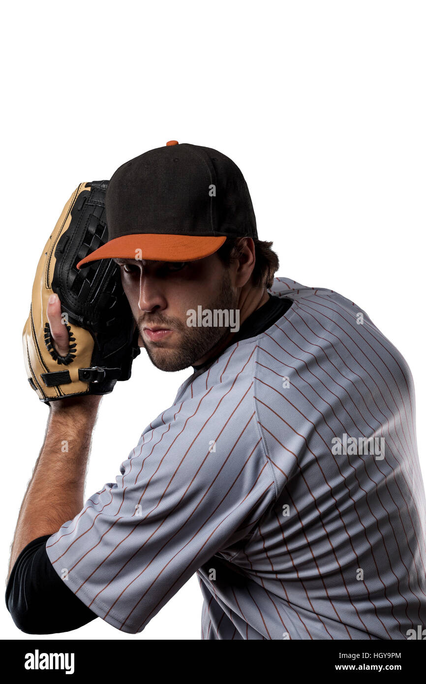 Baseball Player in a Orange uniform, on a white background Stock Photo ...