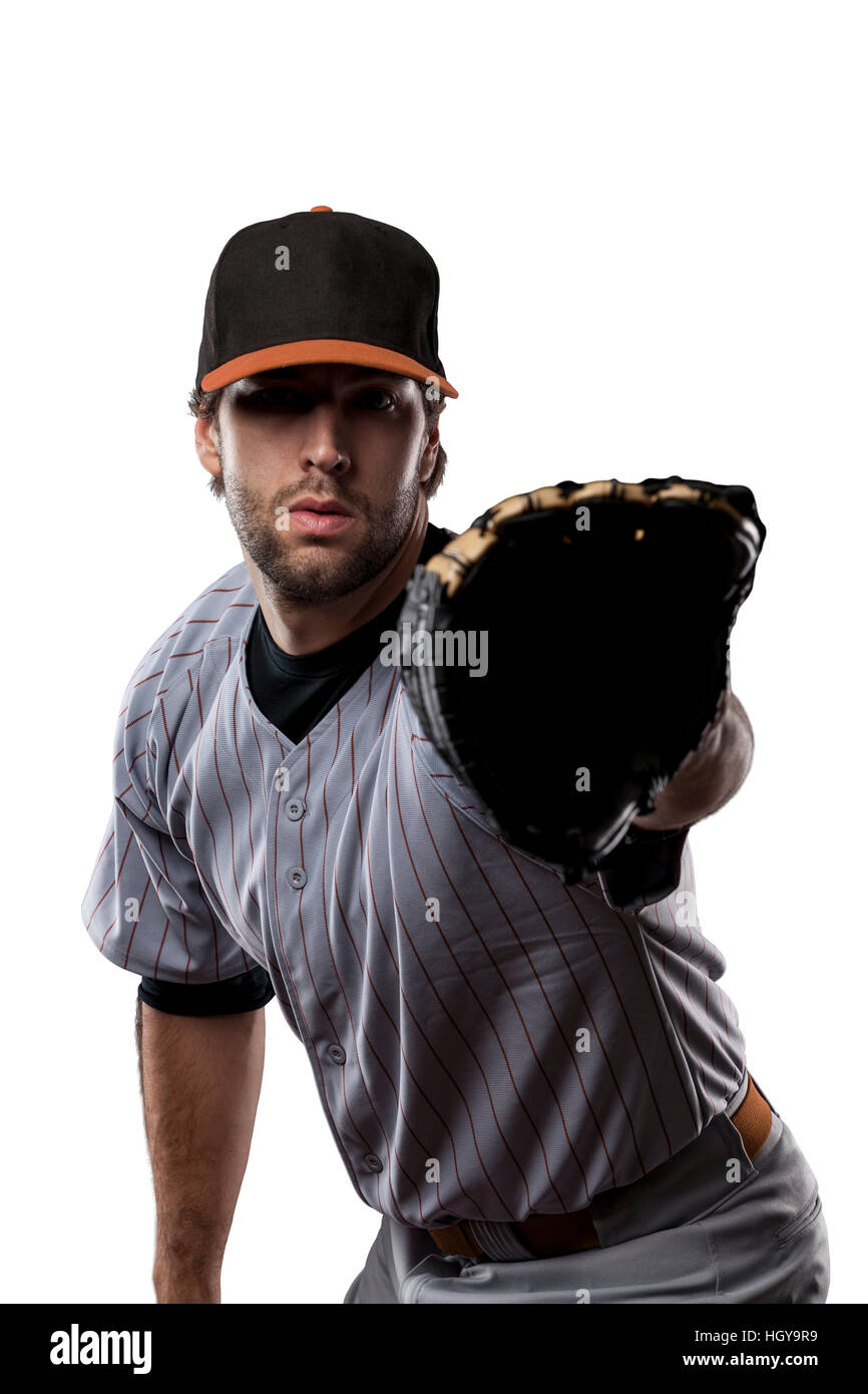 Baseball Player in a Orange uniform, on a white background Stock Photo ...