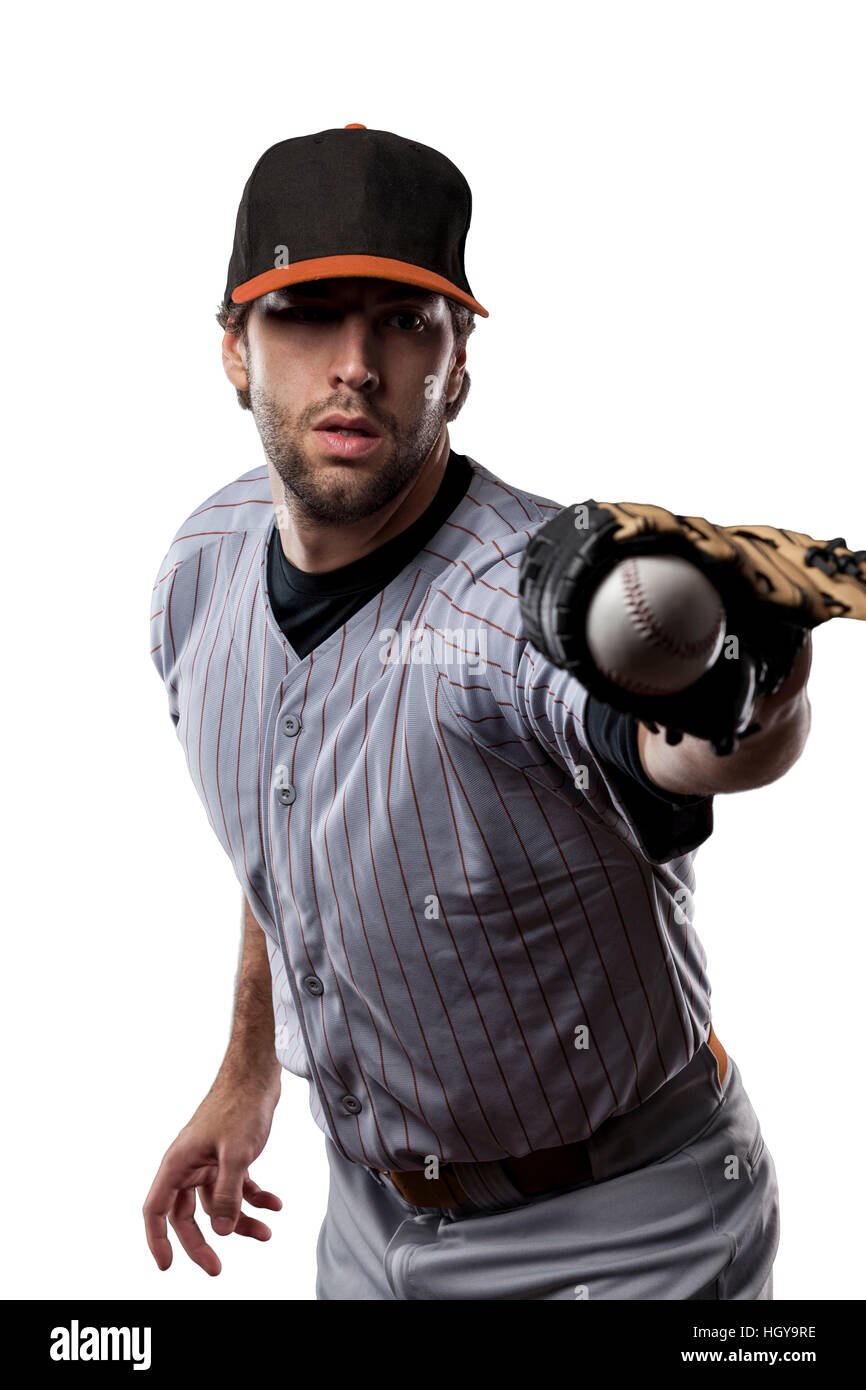 Baseball Player in a Orange uniform, on a white background Stock Photo ...