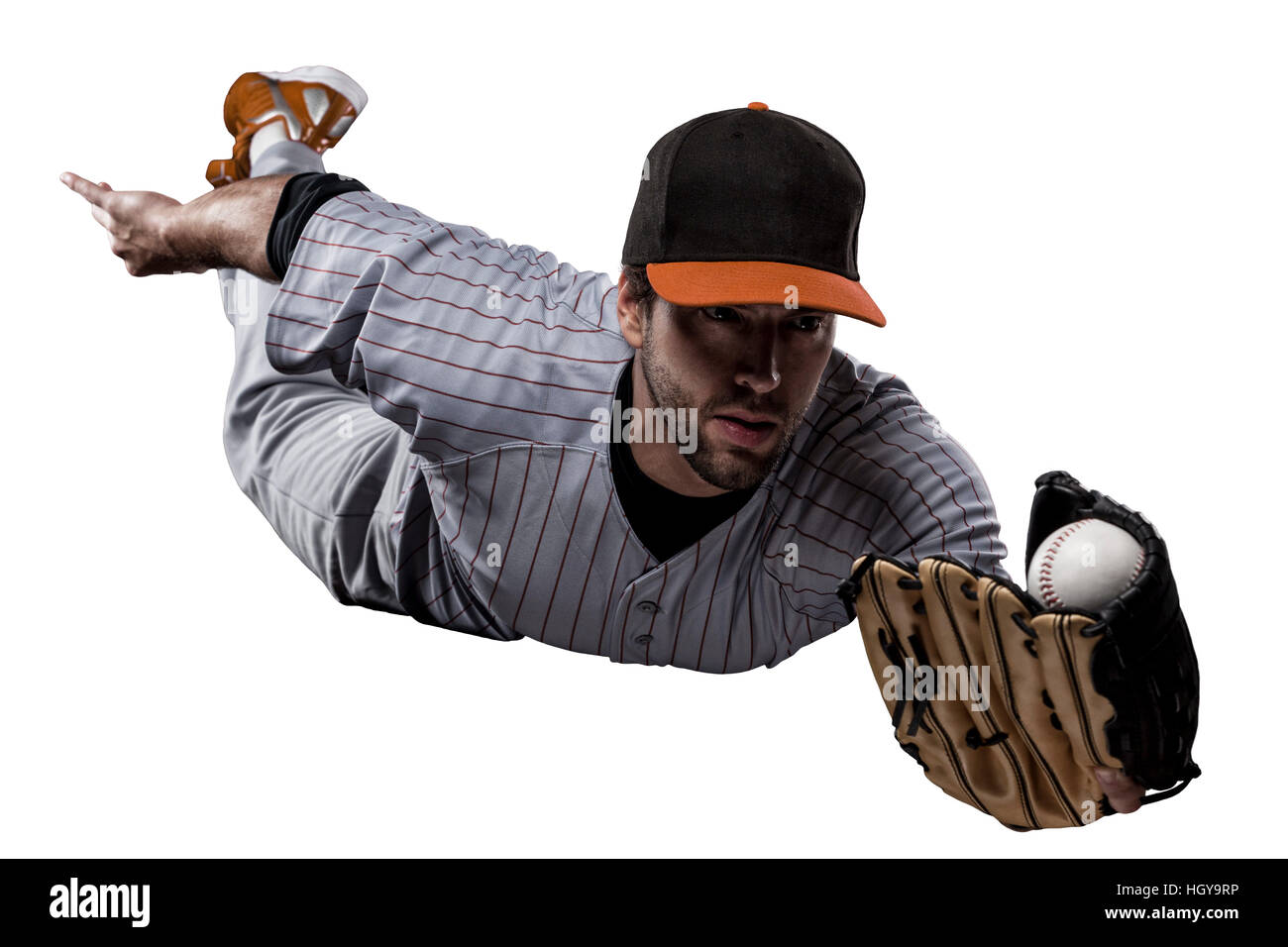 Baseball Player in a Orange uniform, on a white background Stock Photo ...