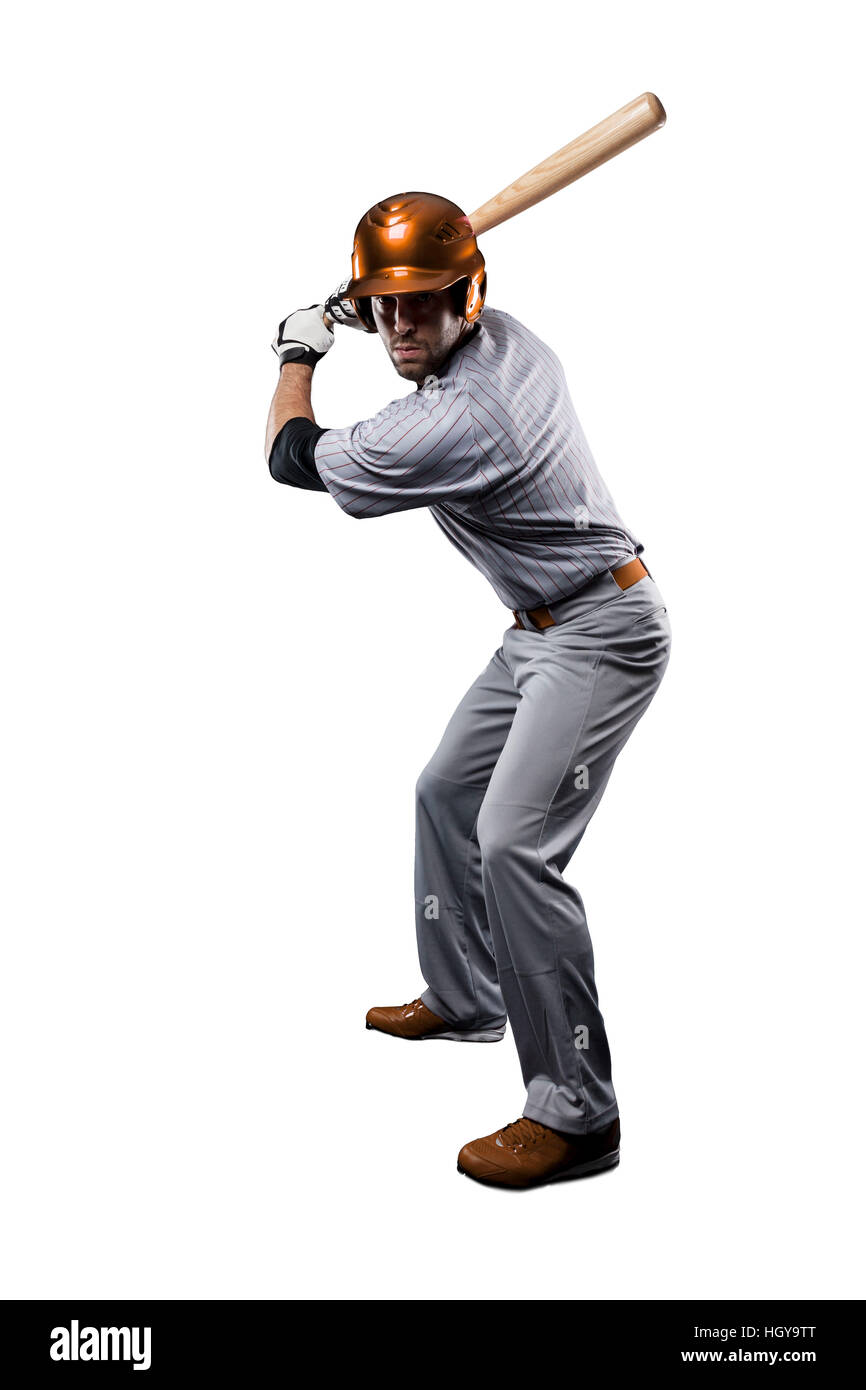 Baseball Player in a Orange uniform, on a white background Stock Photo ...