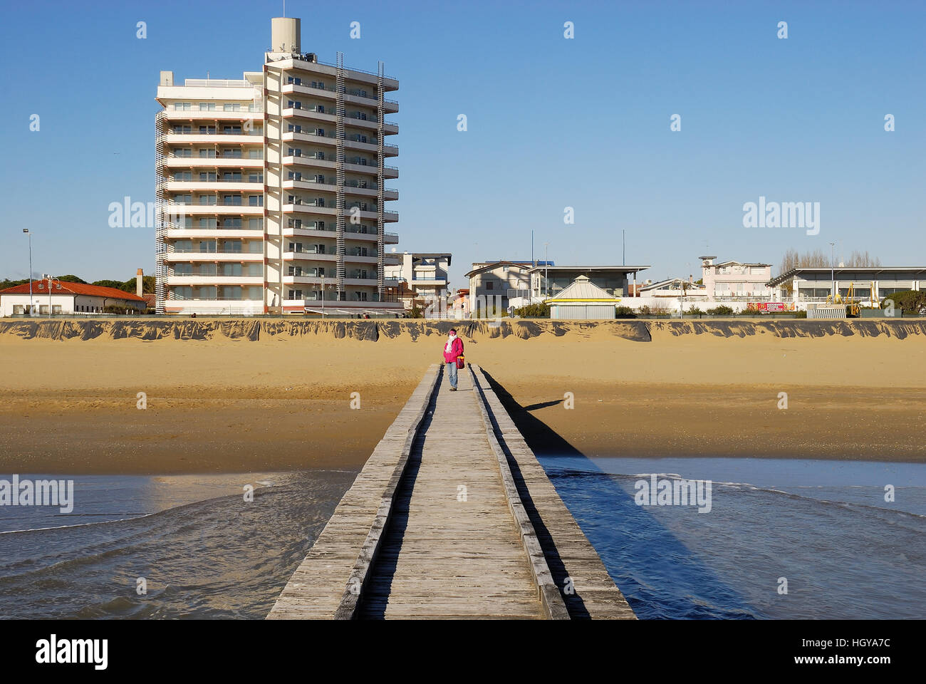 Jesolo, Veneto, Italy. Jesolo Lido beach. A pier and a resort Stock ...