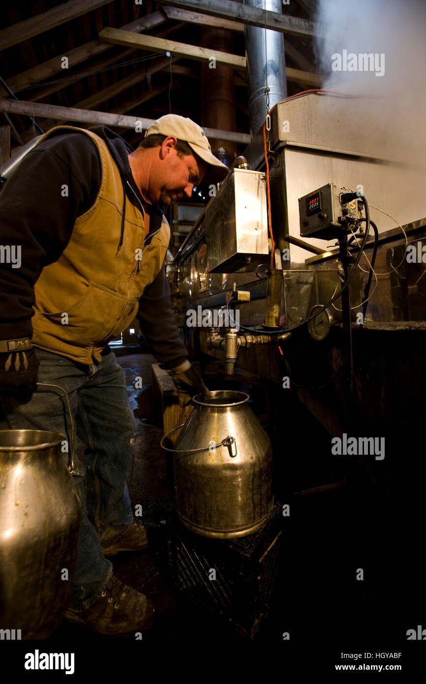 jeff Luce tending the sap bucket in his sugar house at Sugarbush Farm ...