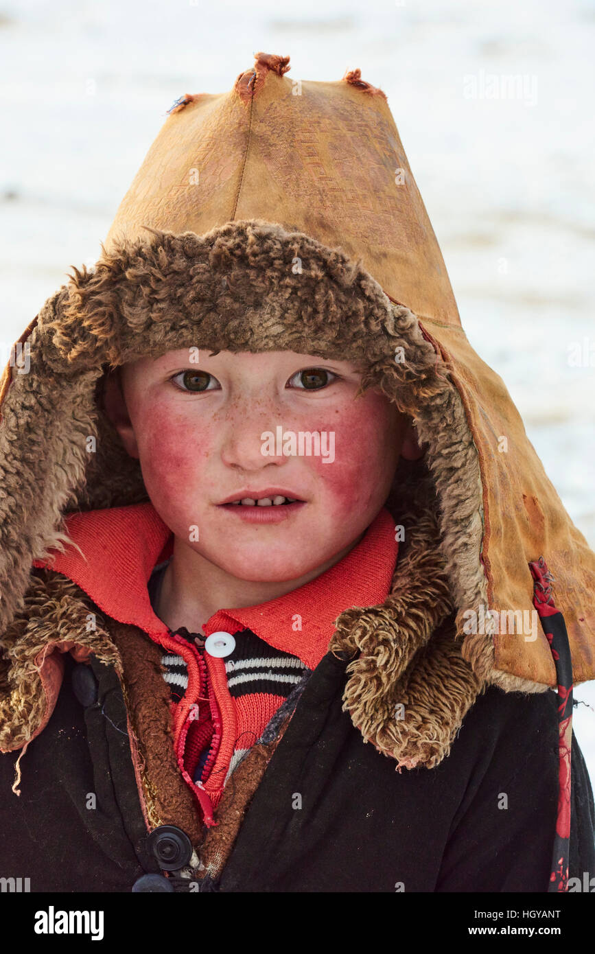 Mongolia, Bayan-Olgii province, Kazakh young boy Stock Photo - Alamy