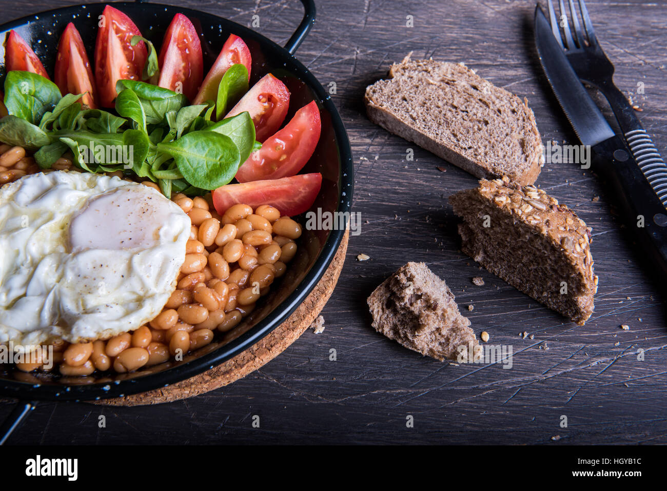Full english breakfast with fried eggs baked beans hi-res stock ...