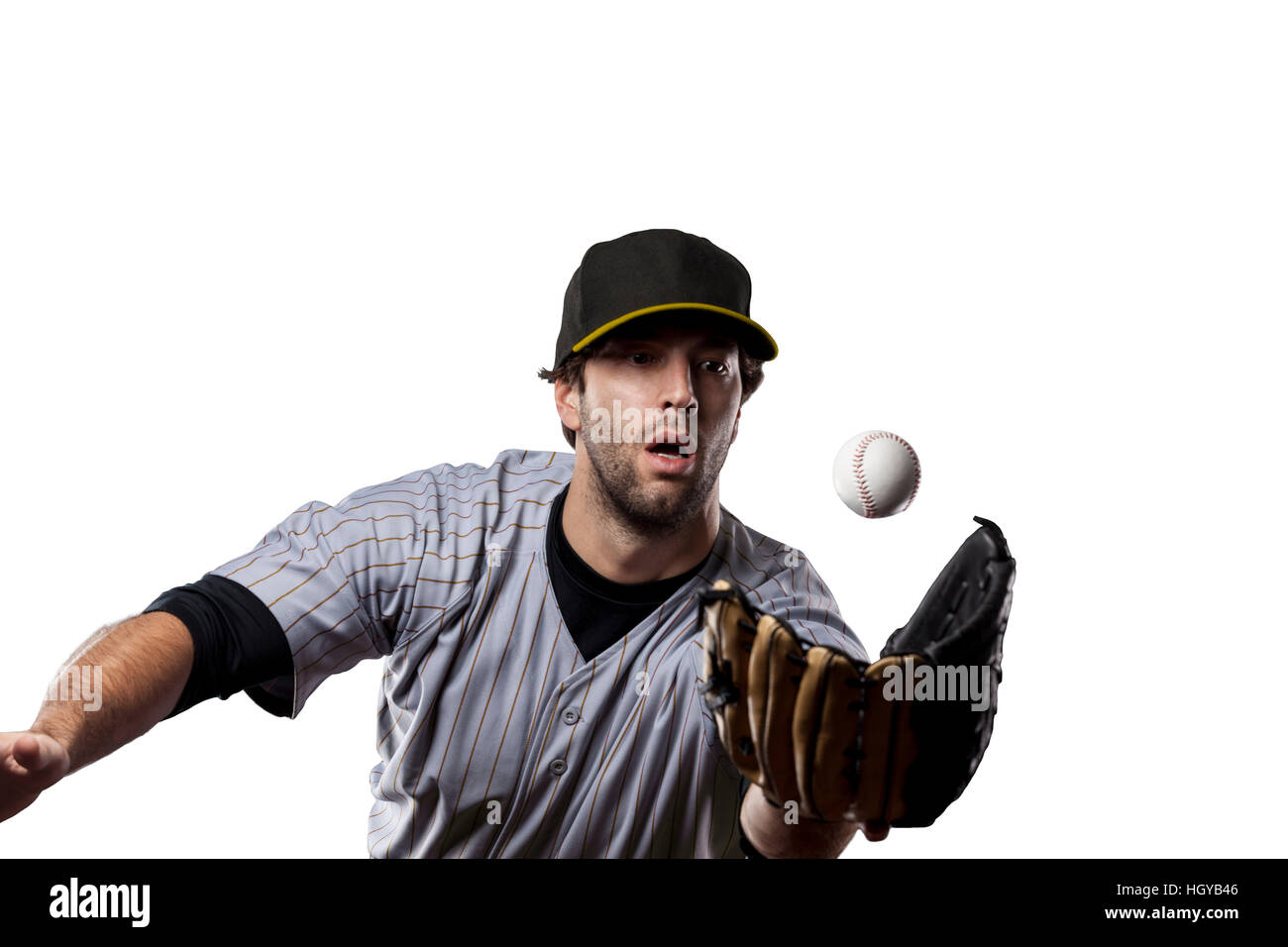 Baseball Player in a Yellow uniform, on a white background Stock Photo ...