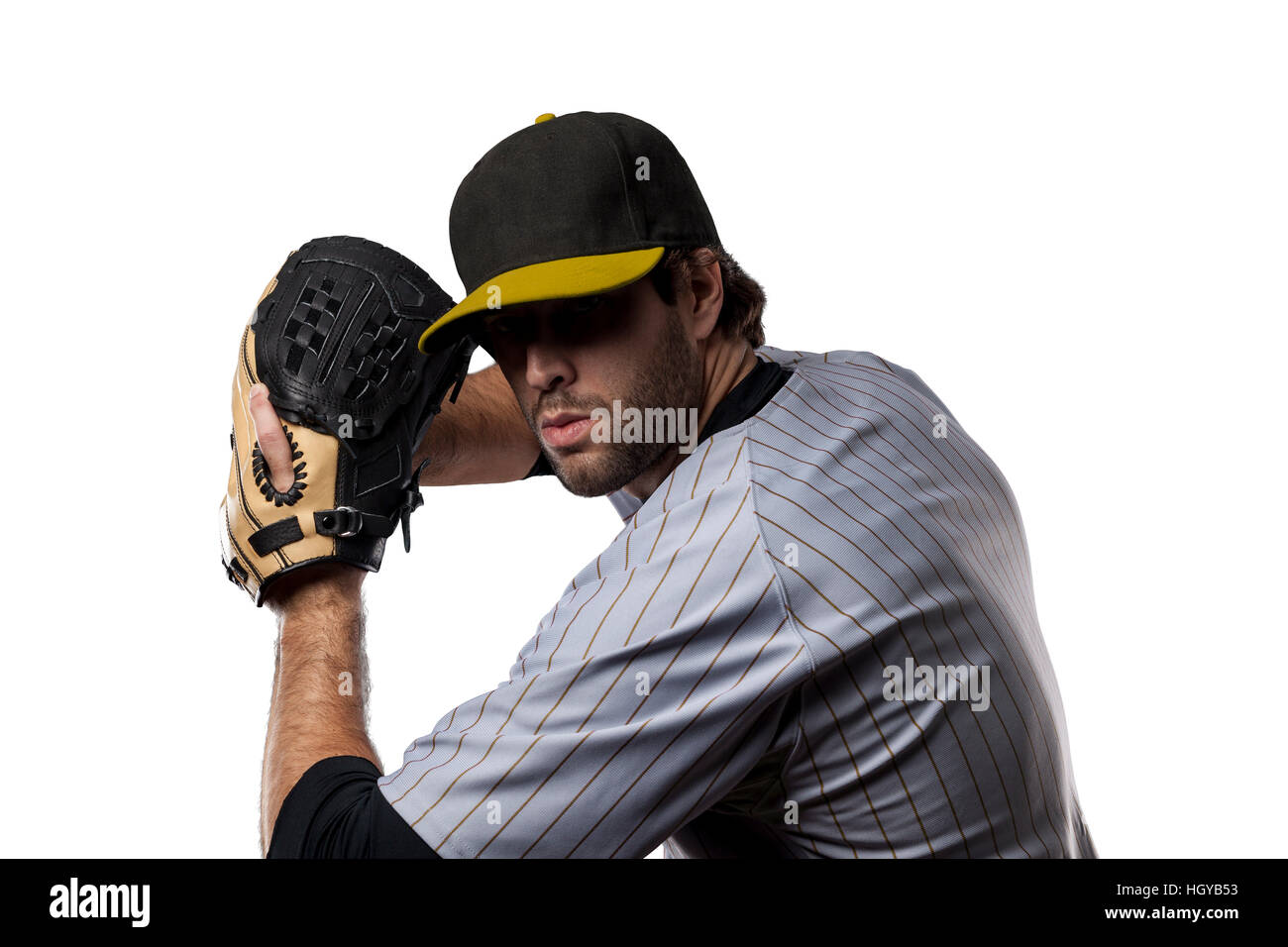 Baseball Player in a Yellow uniform, on a white background Stock Photo ...