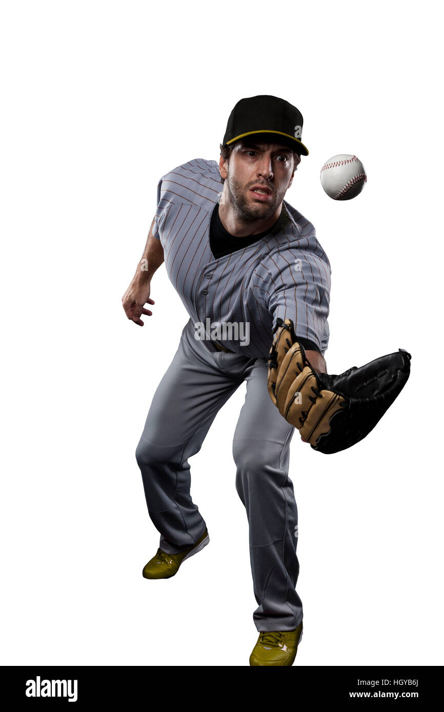 Baseball Player in a Yellow uniform, on a white background Stock Photo ...