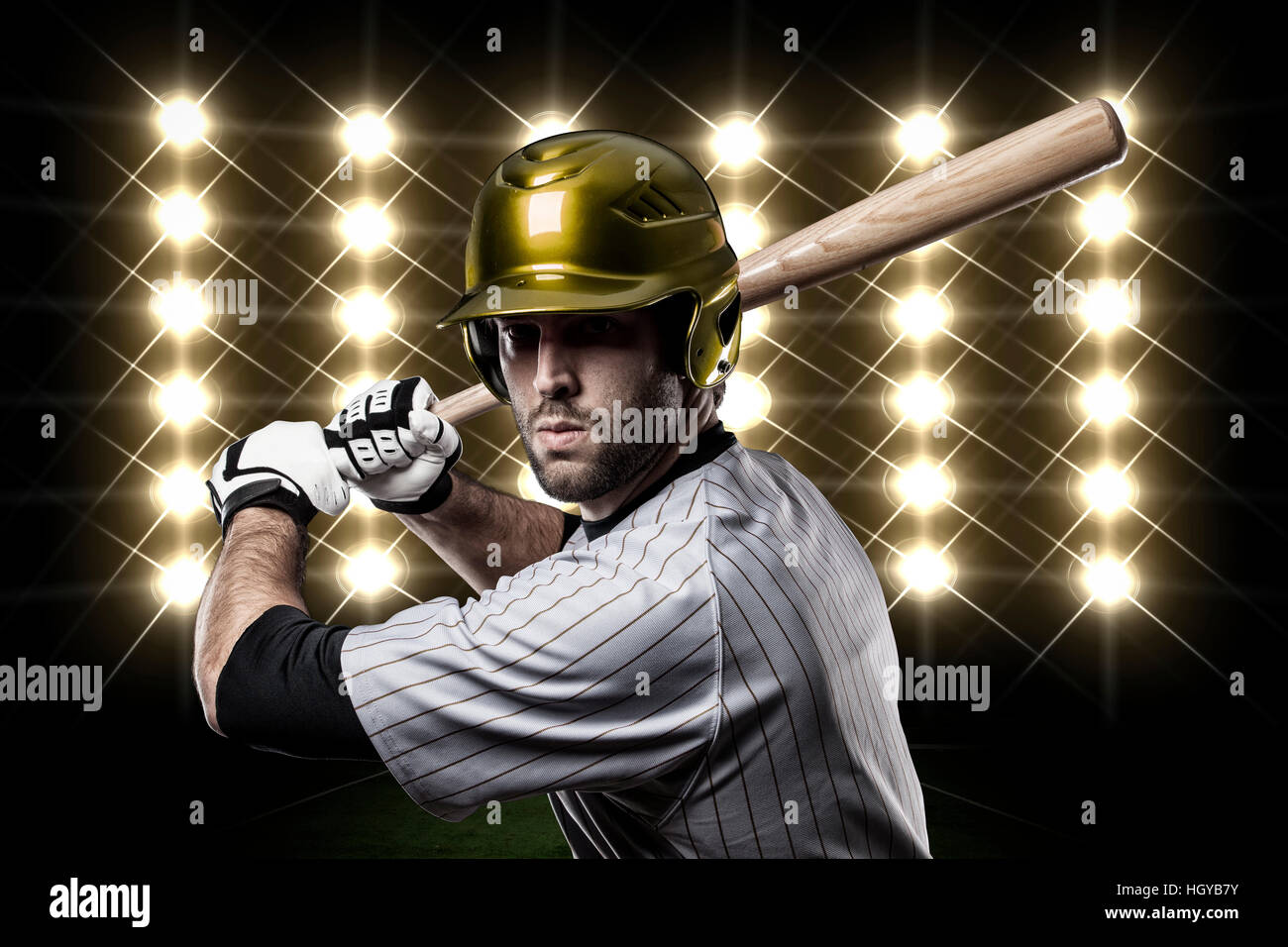 Baseball Player on a Yellow Uniform on baseball Stadium Stock Photo - Alamy