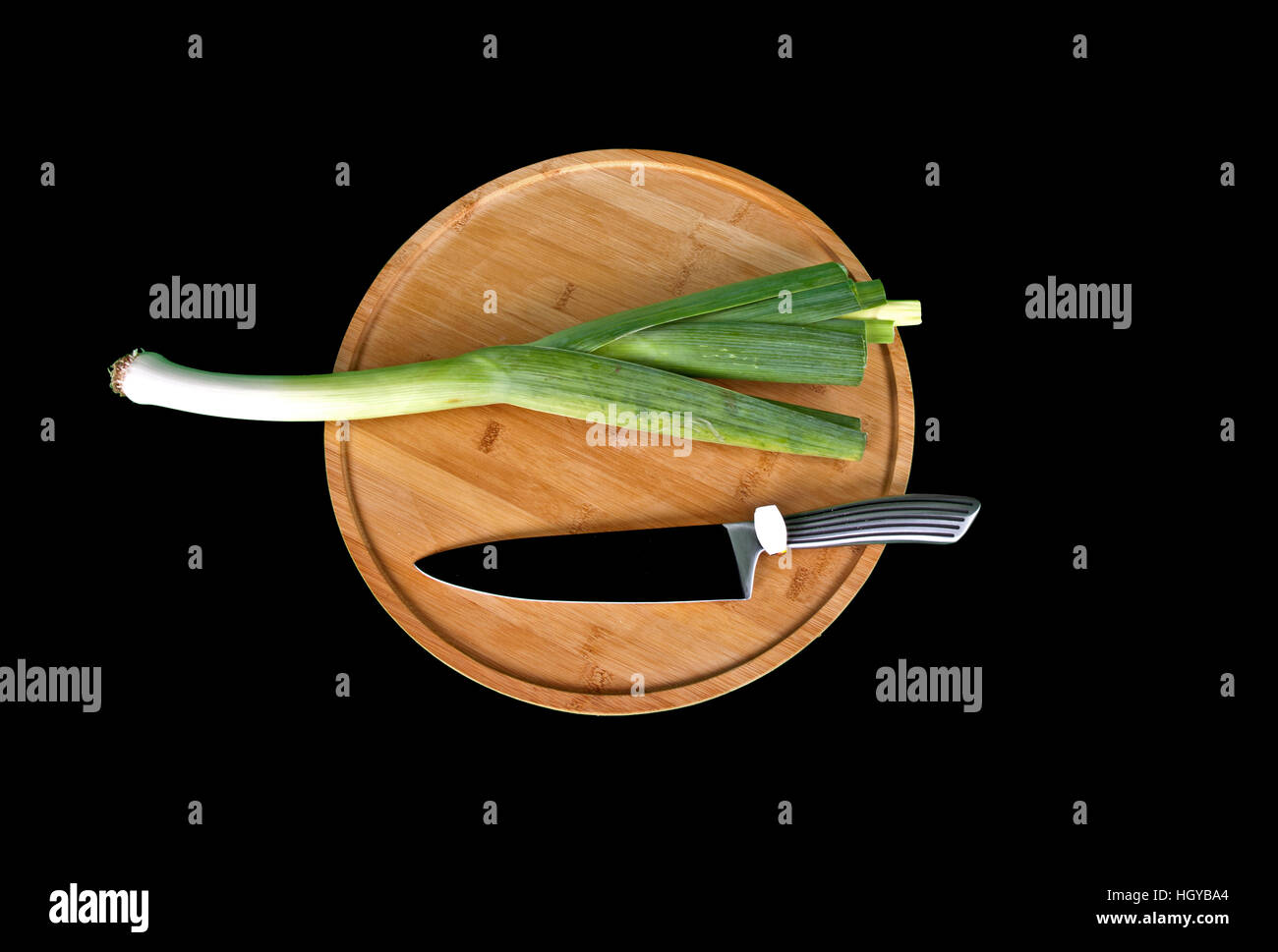 onion spring on a chopping board Stock Photo - Alamy