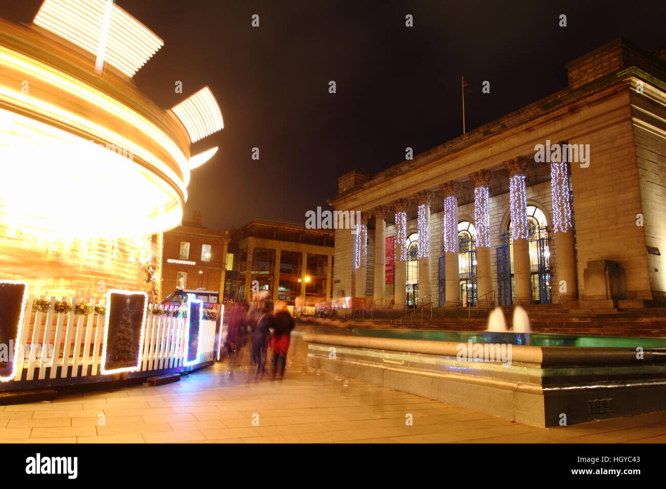 'Gallopers' fairground ride in full swing next to festive City Hall (r ...