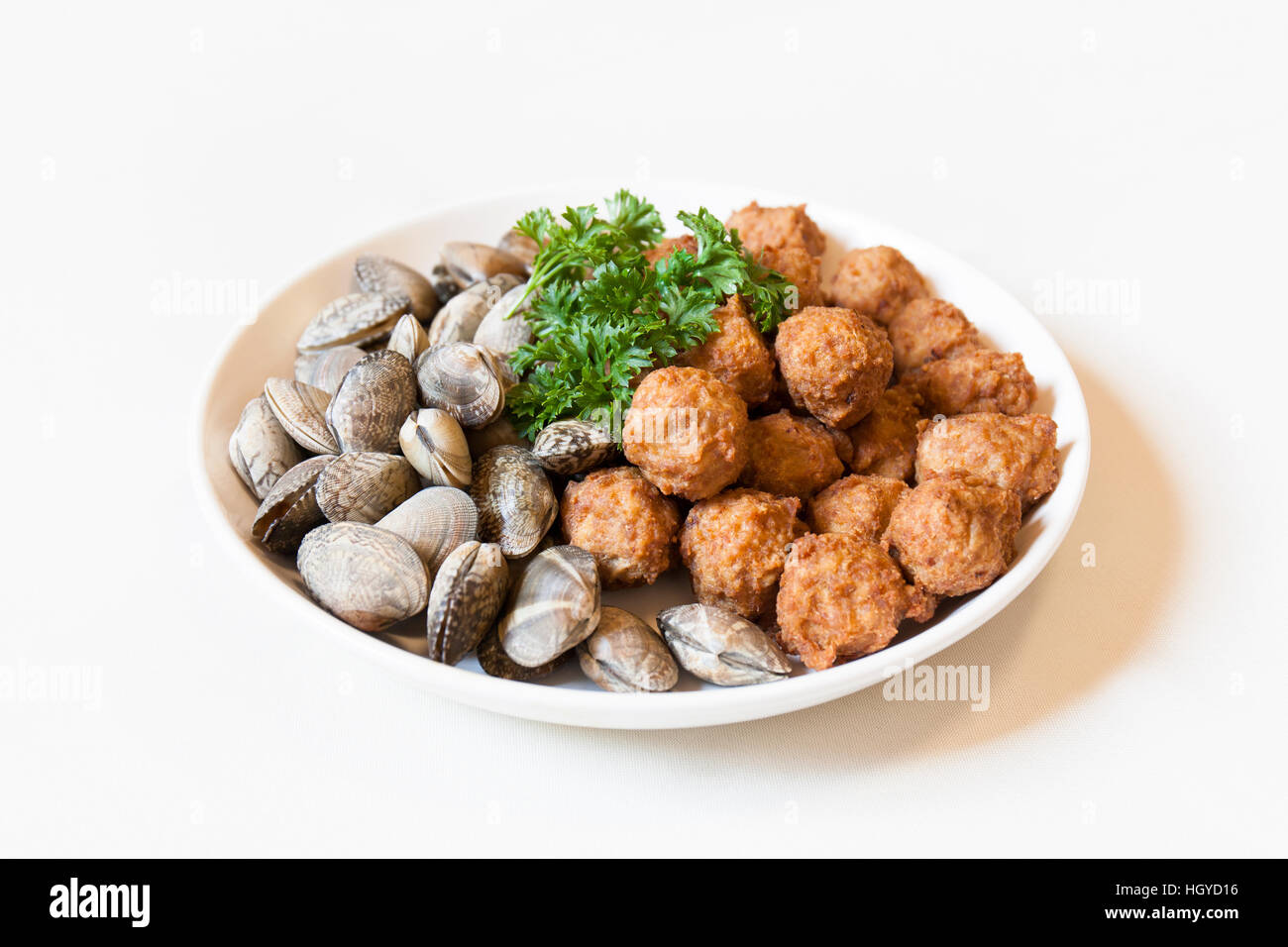 Vegetable balls and clams Stock Photo - Alamy