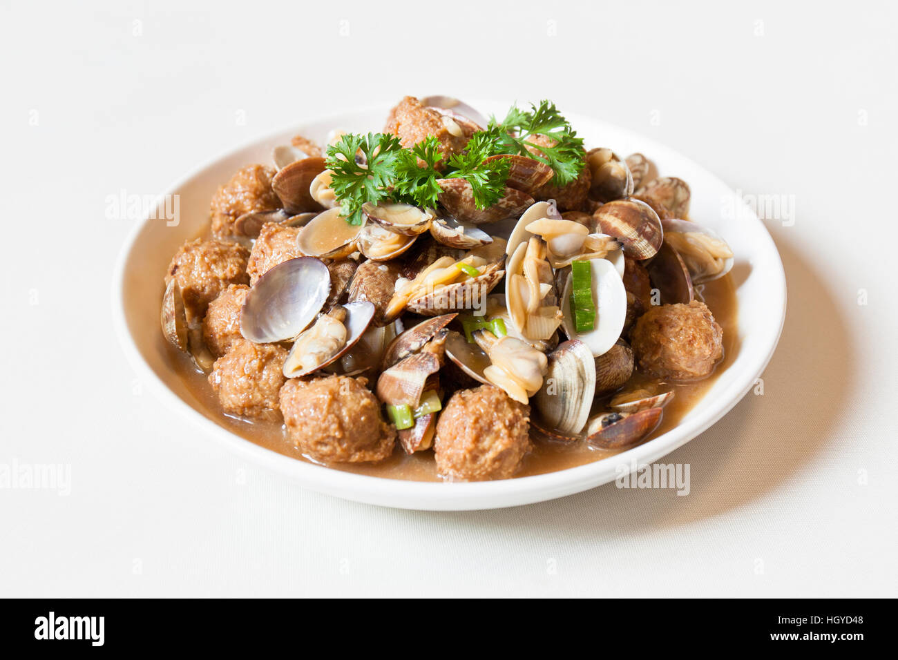 Vegetable balls and clams Stock Photo - Alamy