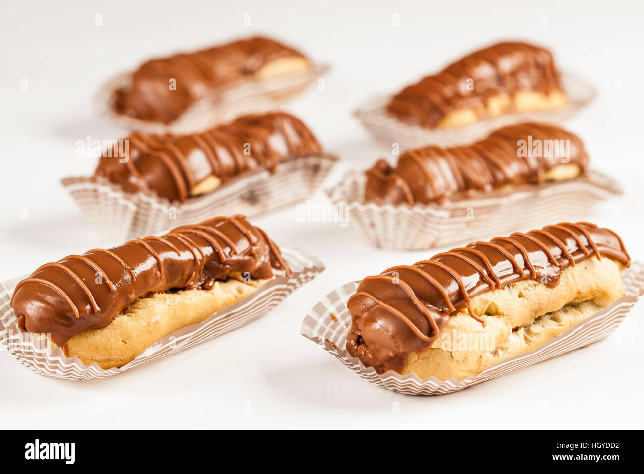Bomba de chocolate. A Brazilian traditional eclair on a white ...