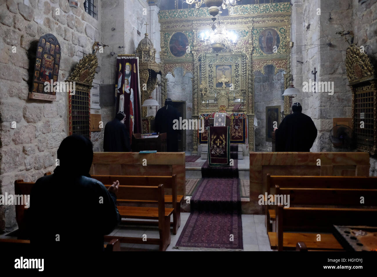 Syriac Orthodox clerics praying inside San Marcos or Saint Mark Syrian ...