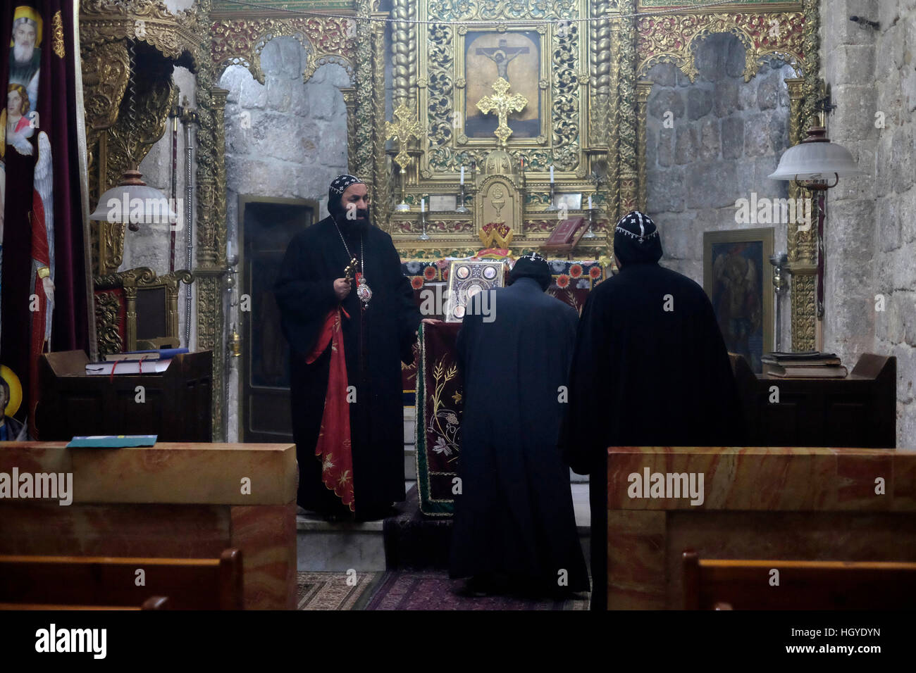 Syriac Orthodox clerics praying inside San Marcos or Saint Mark Syrian ...