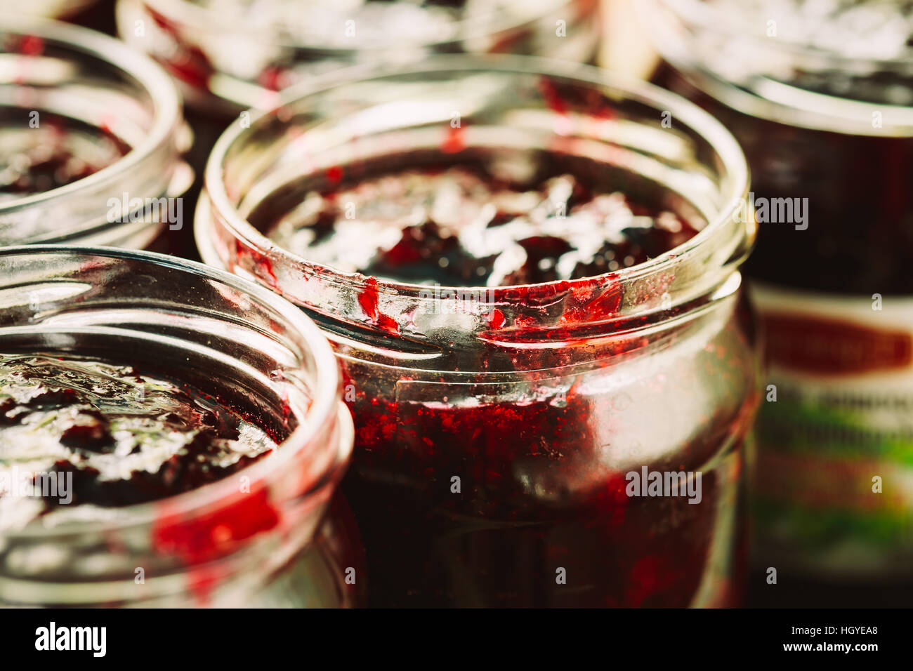 Close Up View Of Jars With Sweet Tasty Yummy Red Jam Stock Photo - Alamy