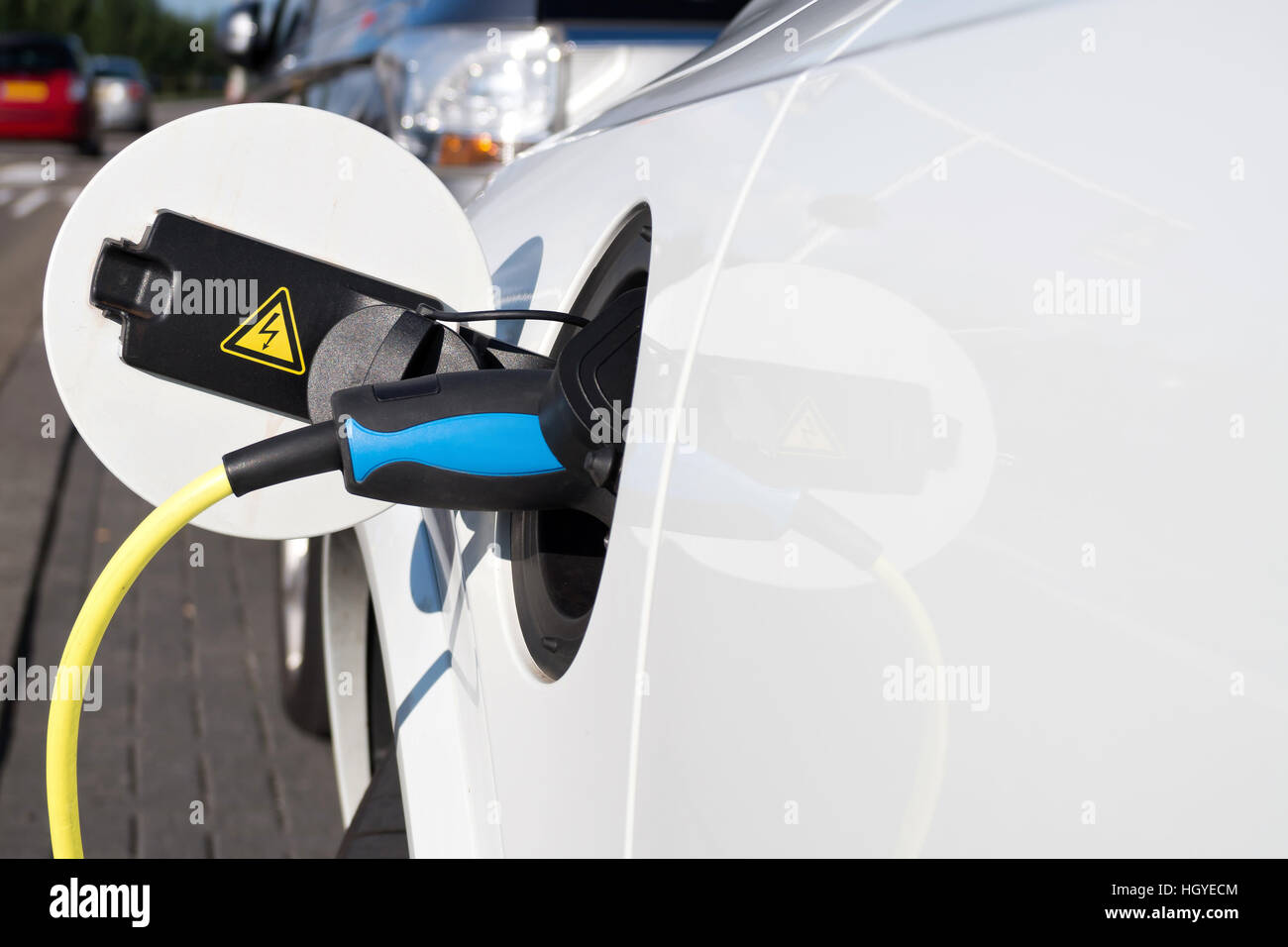 electric car being charged Stock Photo - Alamy