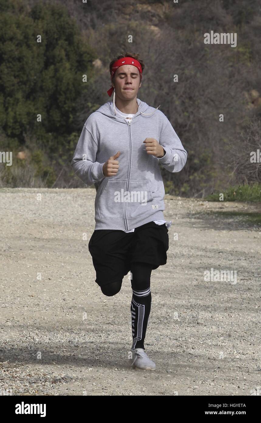 Justin Bieber jogging at Hollywood Hills, in Los Angeles Featuring ...