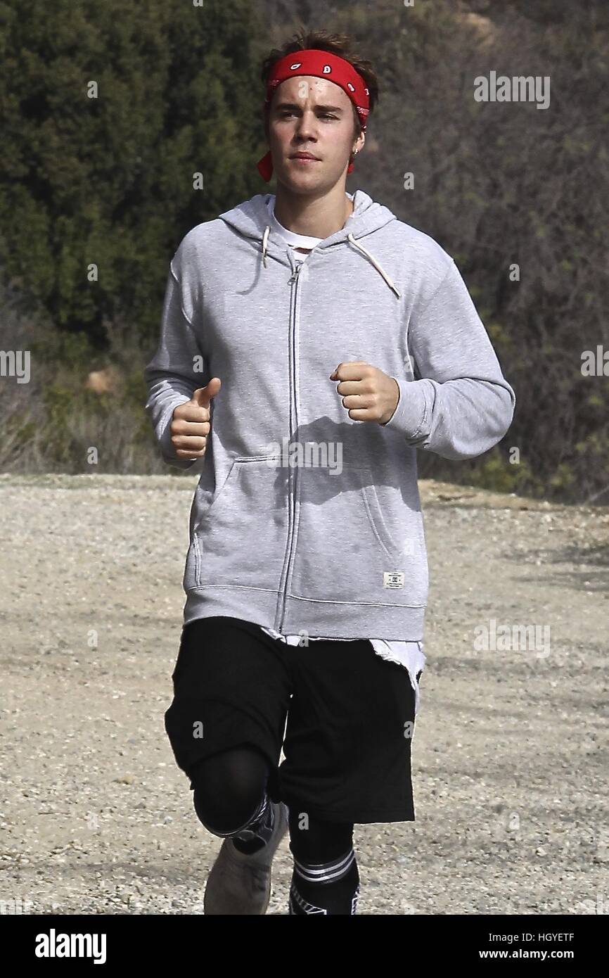 Justin Bieber jogging at Hollywood Hills, in Los Angeles Featuring ...