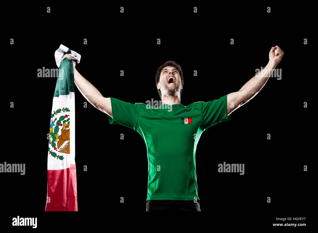 Mexican soccer player, celebrating on the black backgrond Stock Photo ...