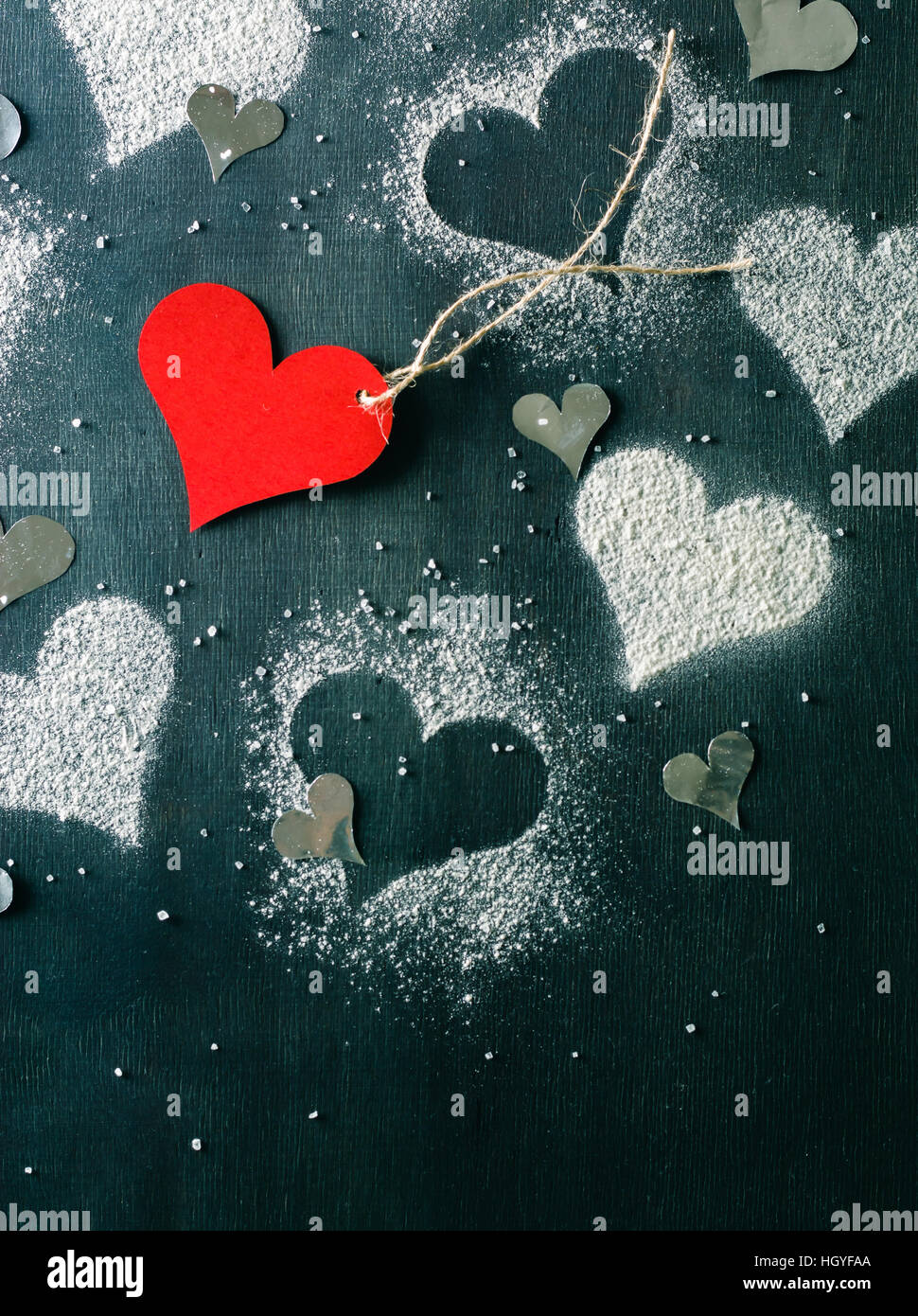 Card for Valentine's Day. Red paper heart on a rope Stock Photo - Alamy