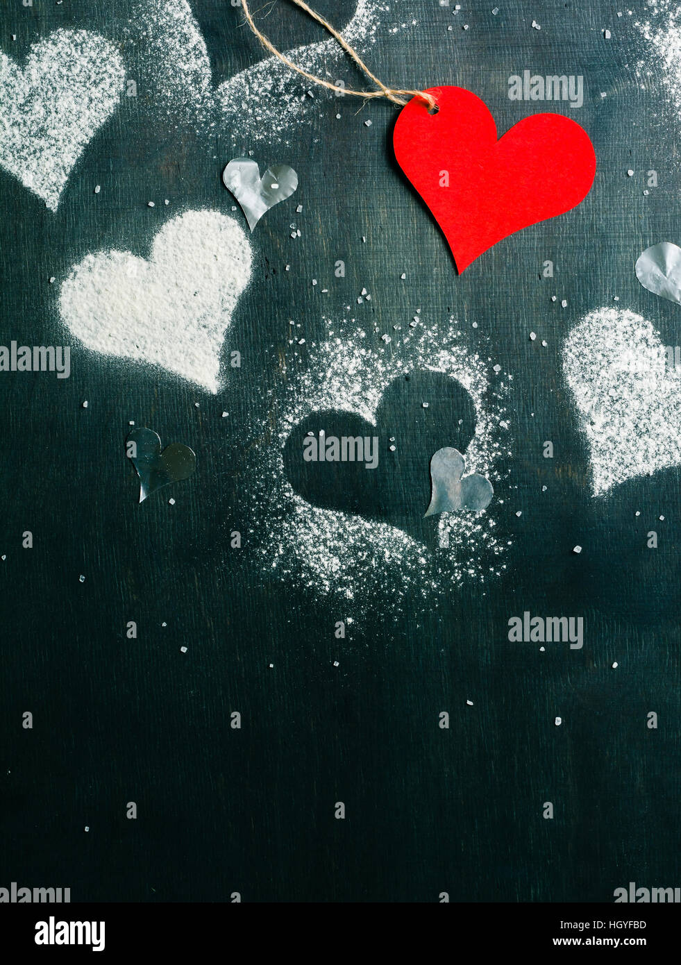 Card for Valentine's Day. Red paper heart on a rope Stock Photo - Alamy