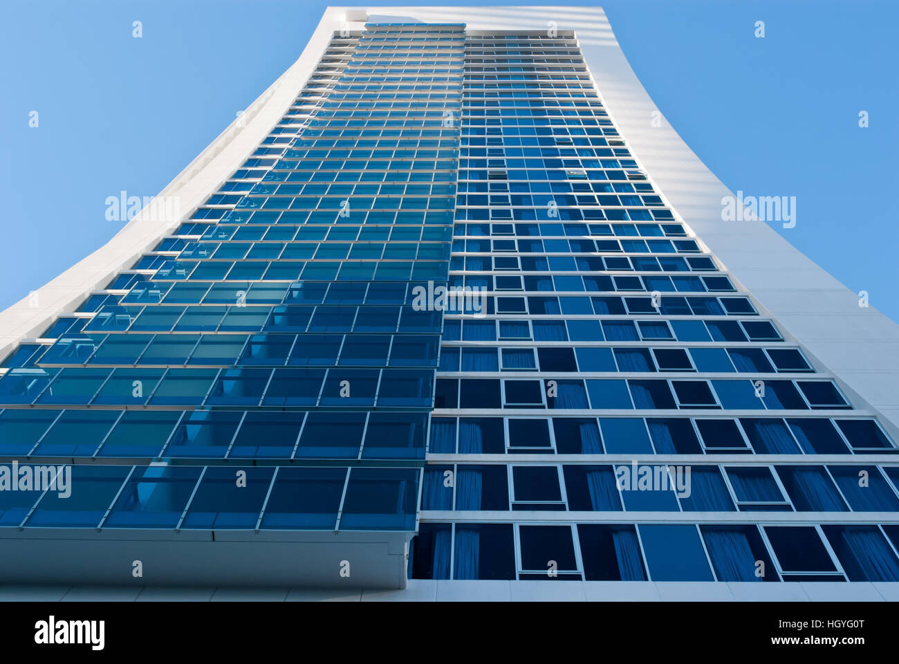 Tall skyscraper with glass facade Stock Photo - Alamy