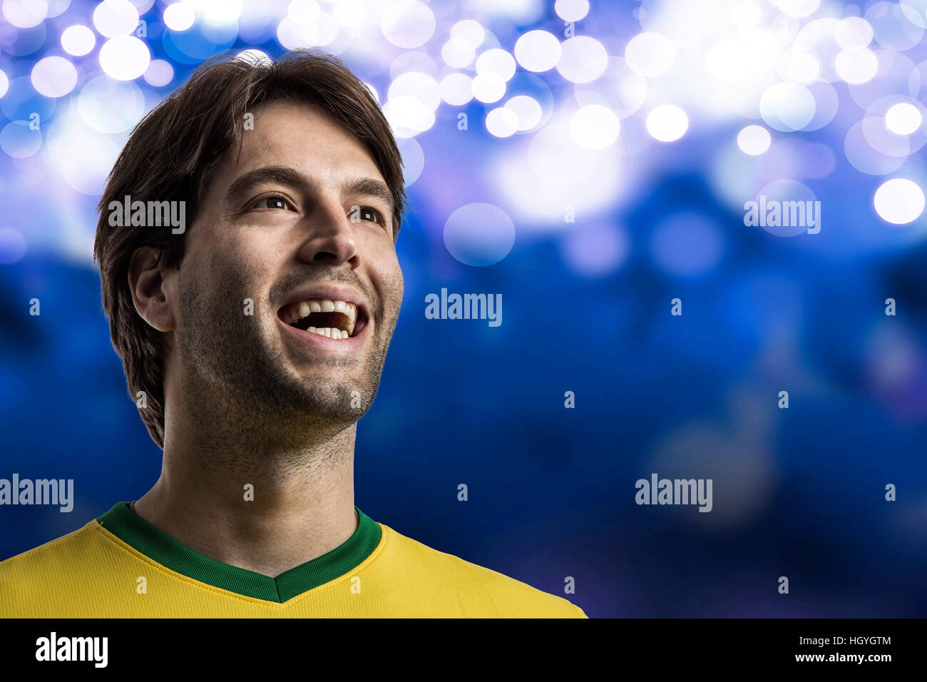 Brazilian soccer player, celebrating on a blue lights background Stock ...
