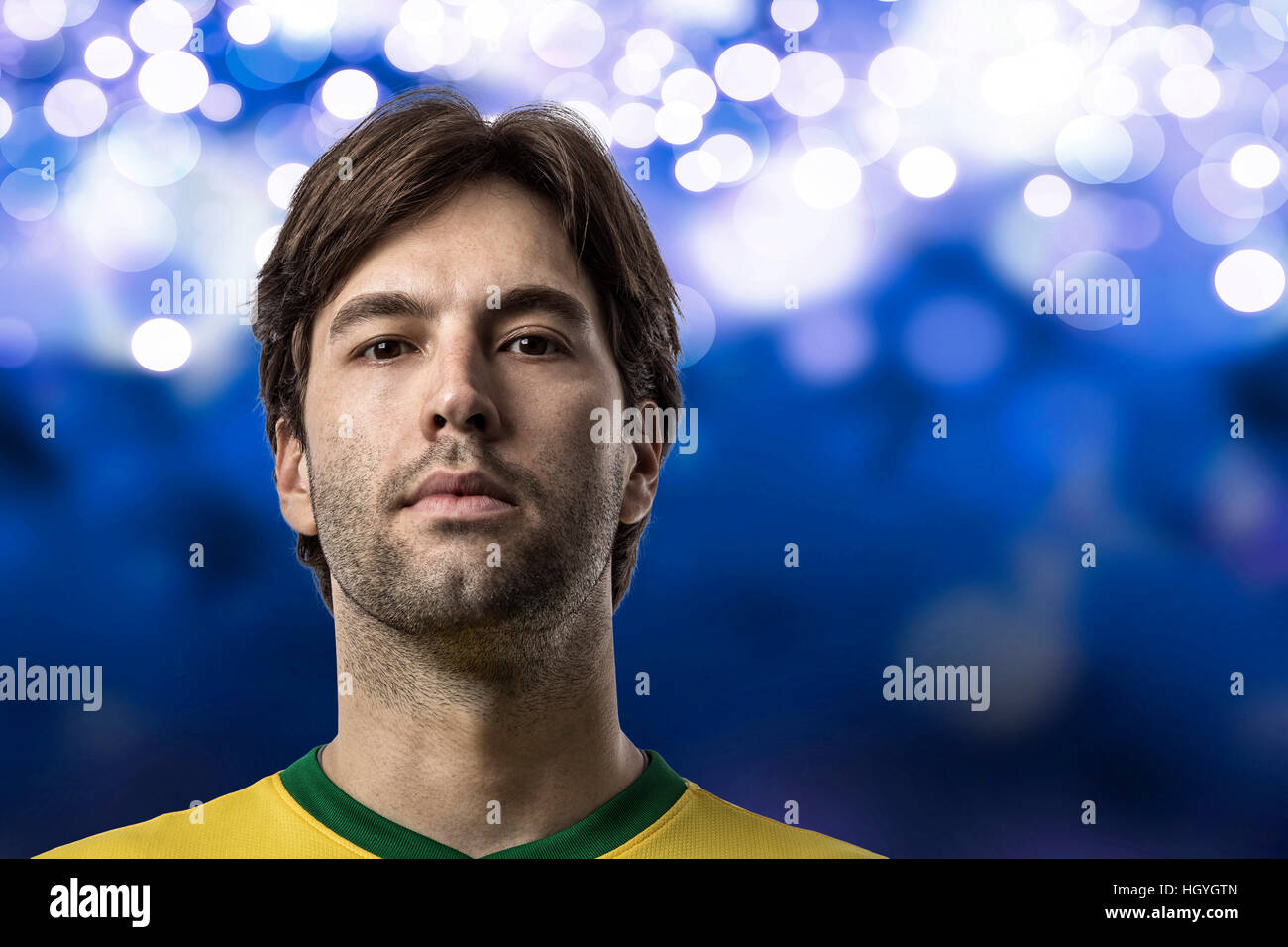 Brazilian soccer player, celebrating on a blue lights background Stock ...
