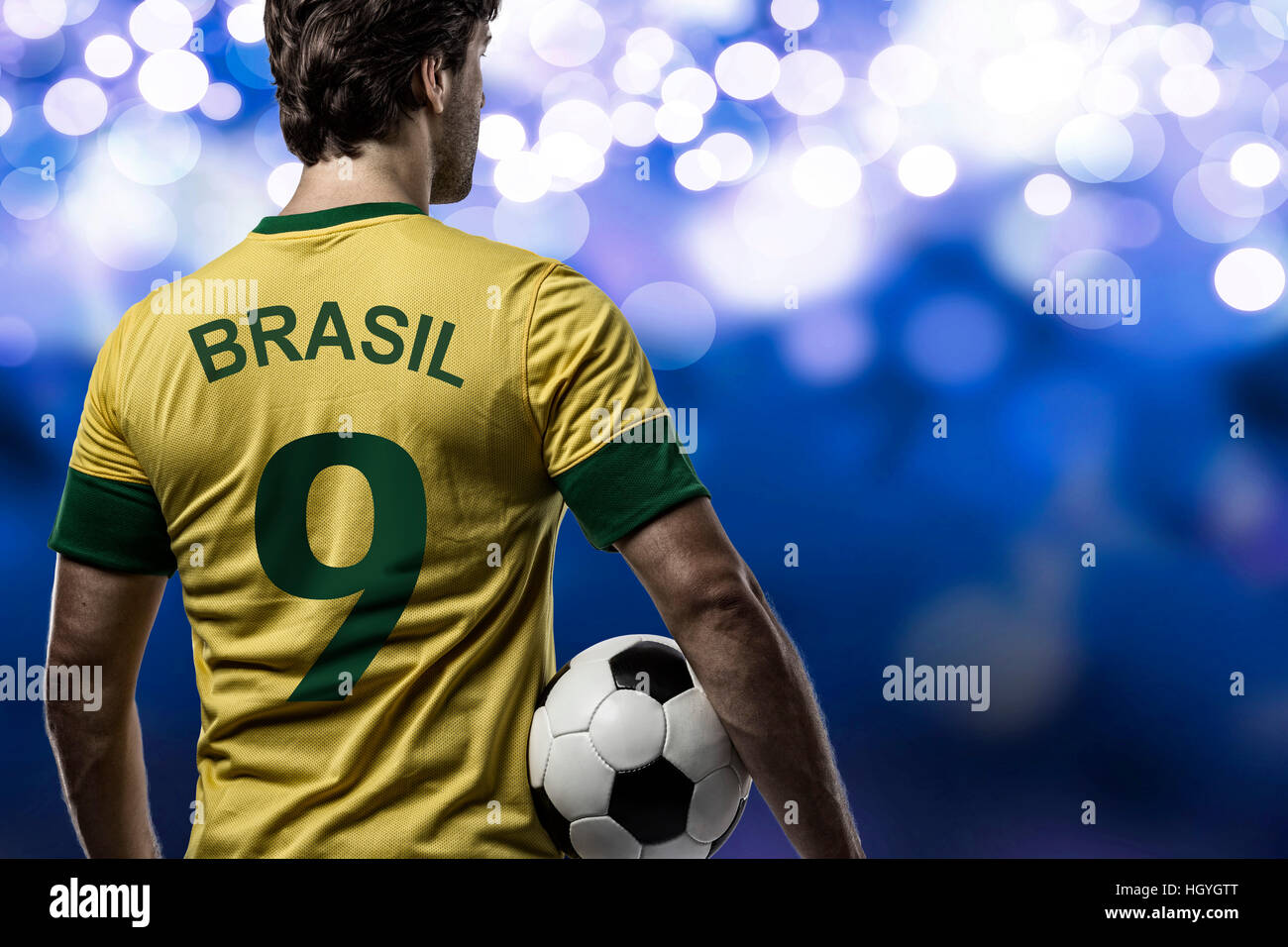 Brazilian soccer player, celebrating on a blue lights background Stock ...