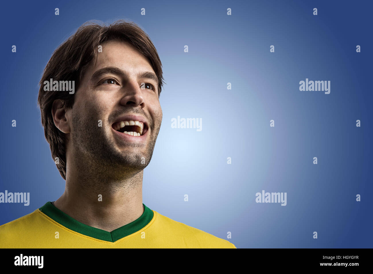 Brazilian soccer player, celebrating on a blue background Stock Photo ...