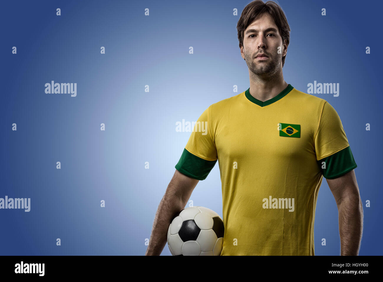 Brazilian soccer player, celebrating on a blue background Stock Photo ...