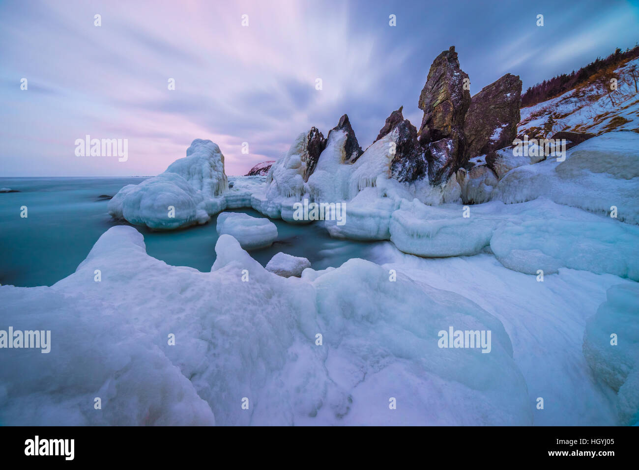 Cliff through a sad sunset in the winter, Sakhalin island Stock Photo ...
