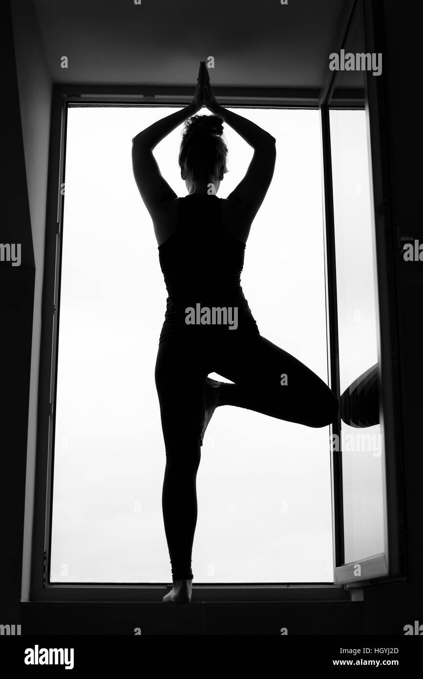 Yoga flexibility woman practicing Black and White Stock Photos & Images ...