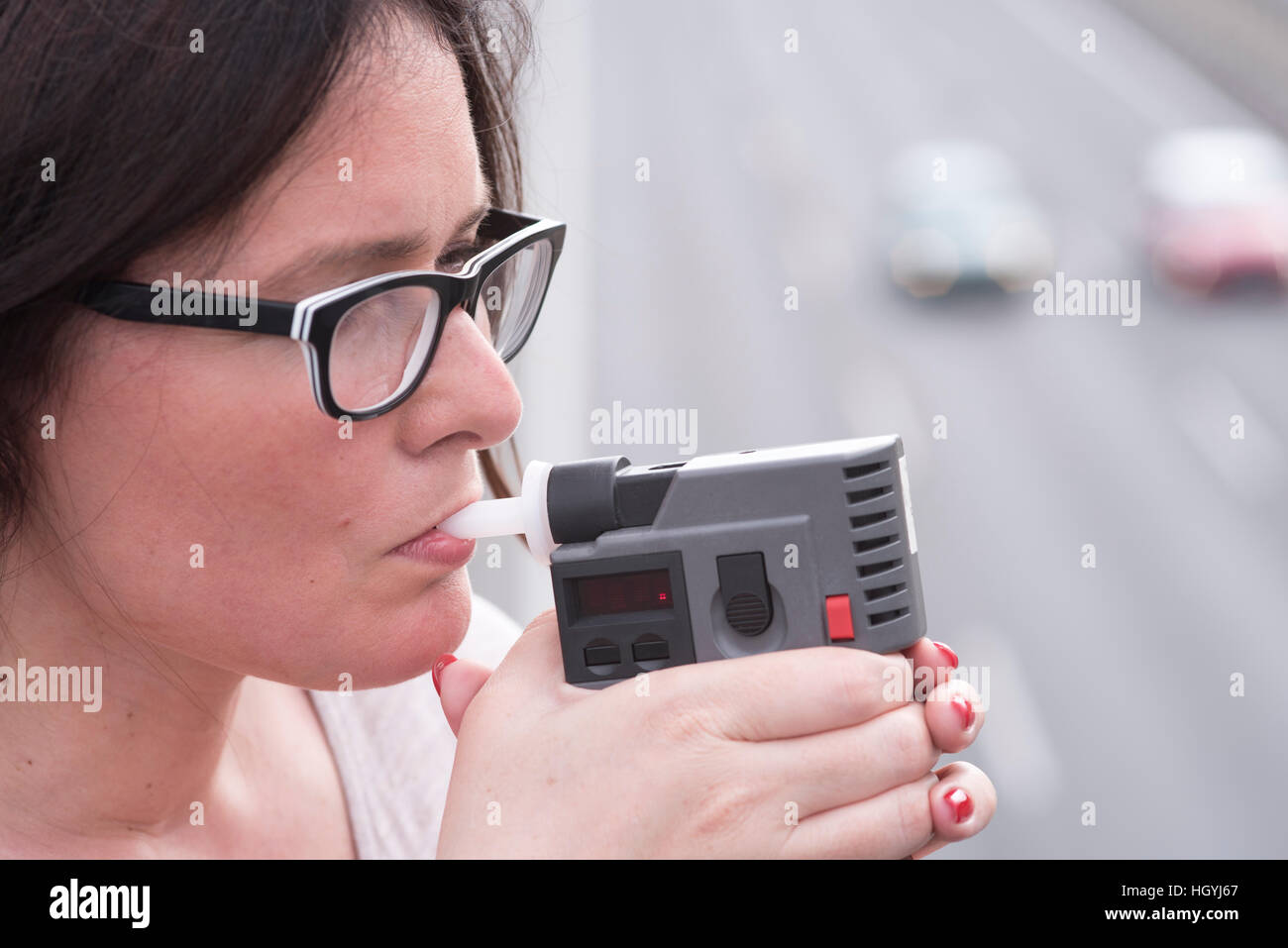 woman investigating on alkom alcohol level Stock Photo - Alamy