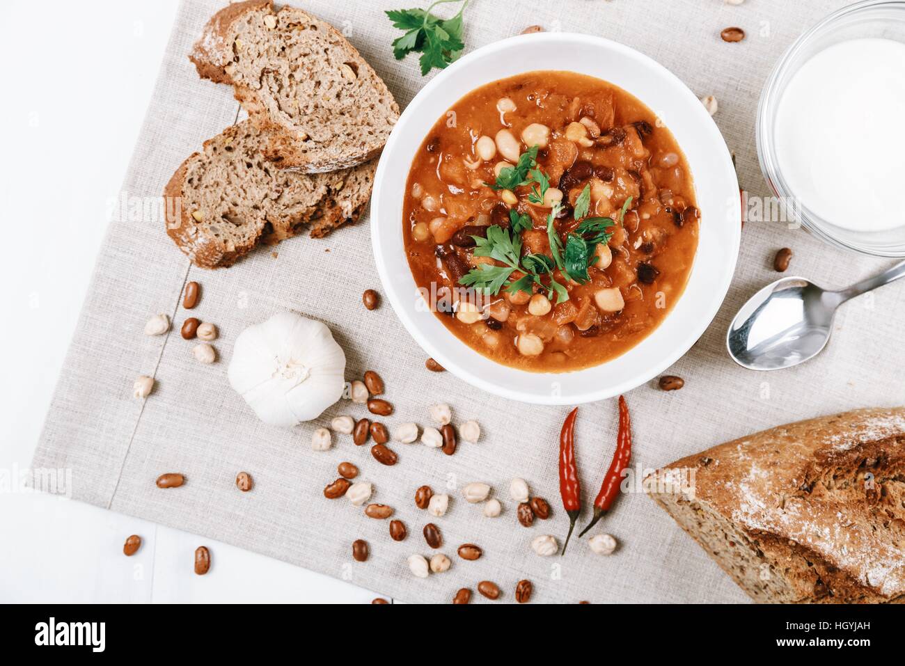 Eating beans table hi-res stock photography and images - Alamy