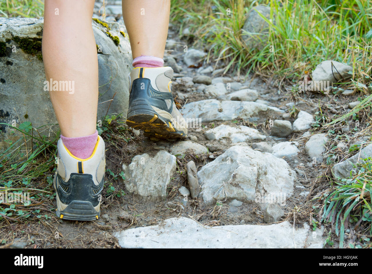 Close-up of the hiker's feet in the footpath Stock Photo - Alamy