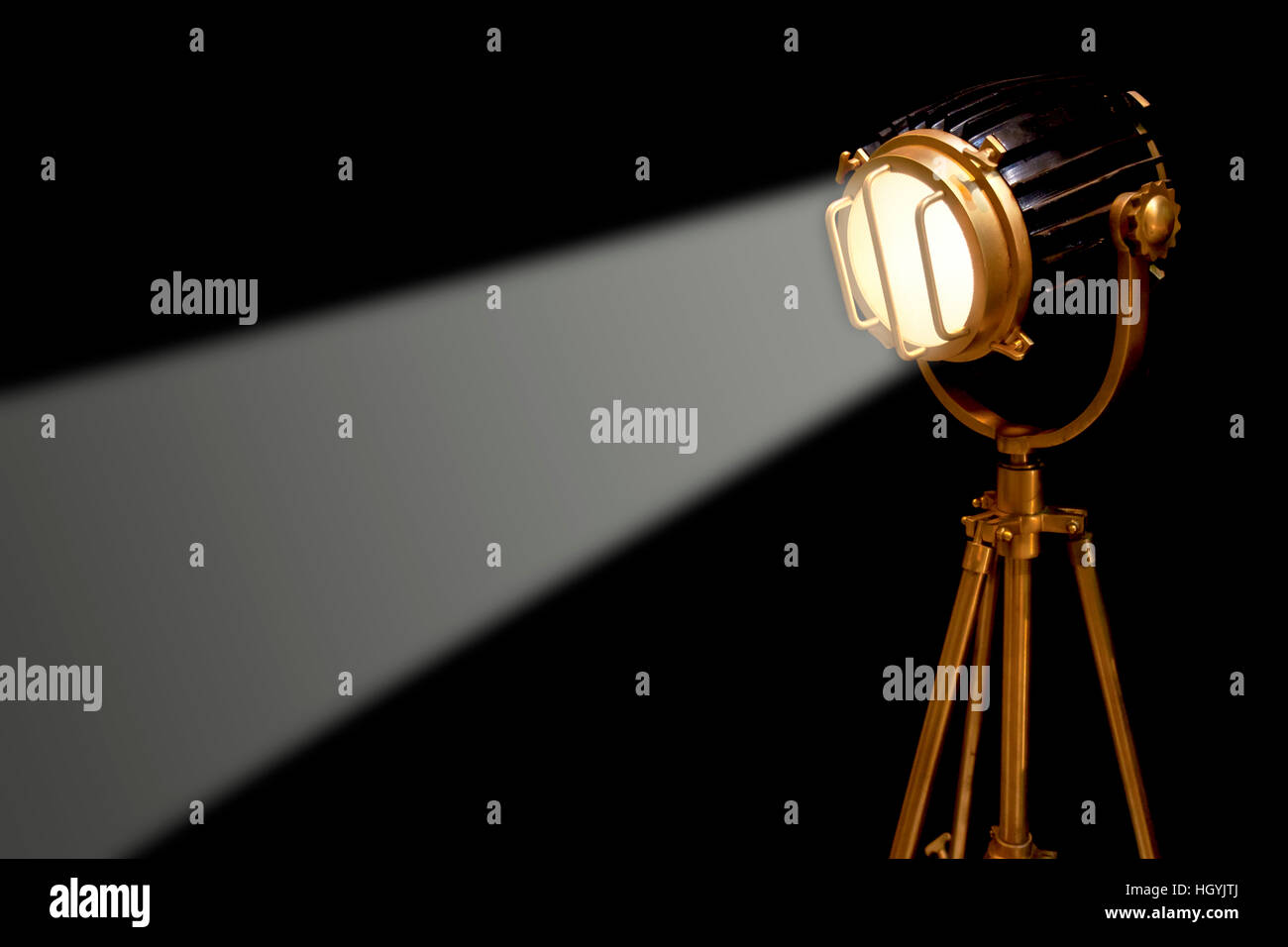 Retro studio light over the black background Stock Photo - Alamy